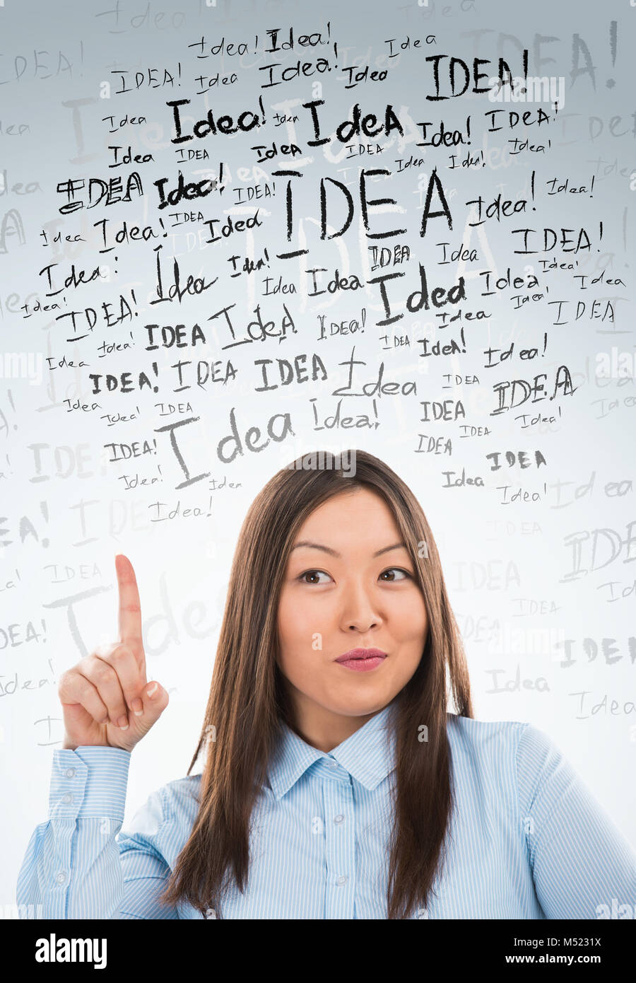 Idea concept. Young business woman with idea signs in front Stock Photo ...