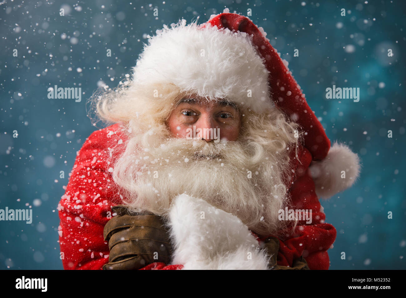 Photo of frozen Santa Claus outdoors in snowfall at north pole at night ...
