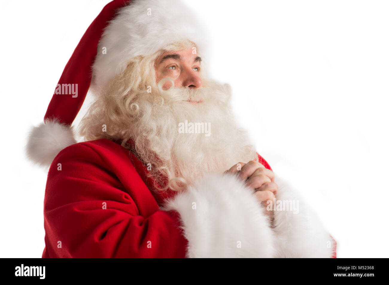 Praying Santa Claus portrait isolated over a white background Stock ...