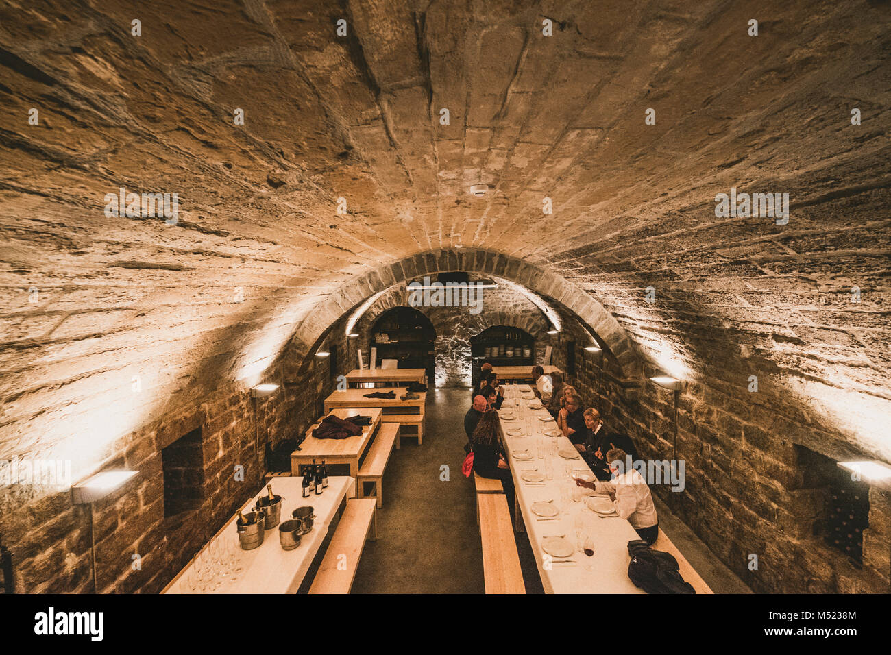 Dinner inside old wine cellar hi-res stock photography and images - Alamy