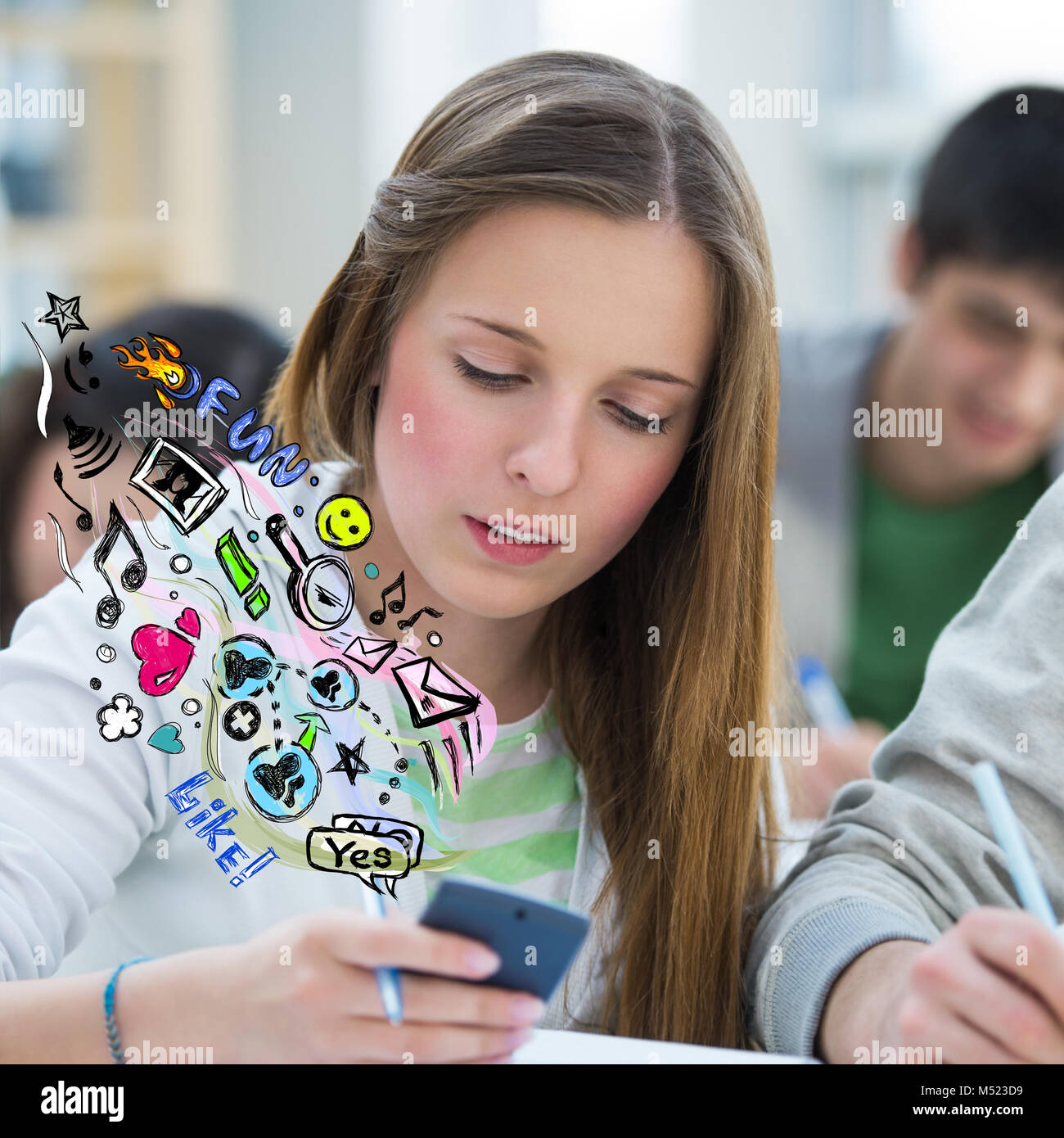 Student using mobile technology to communicate Stock Photo - Alamy