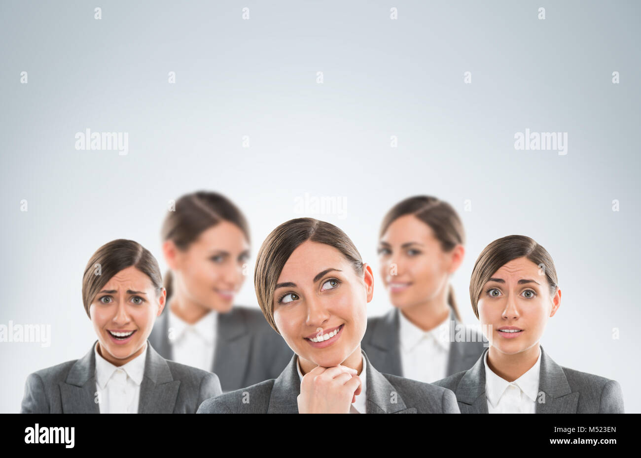 Group of business women clones with different emotions Stock Photo - Alamy