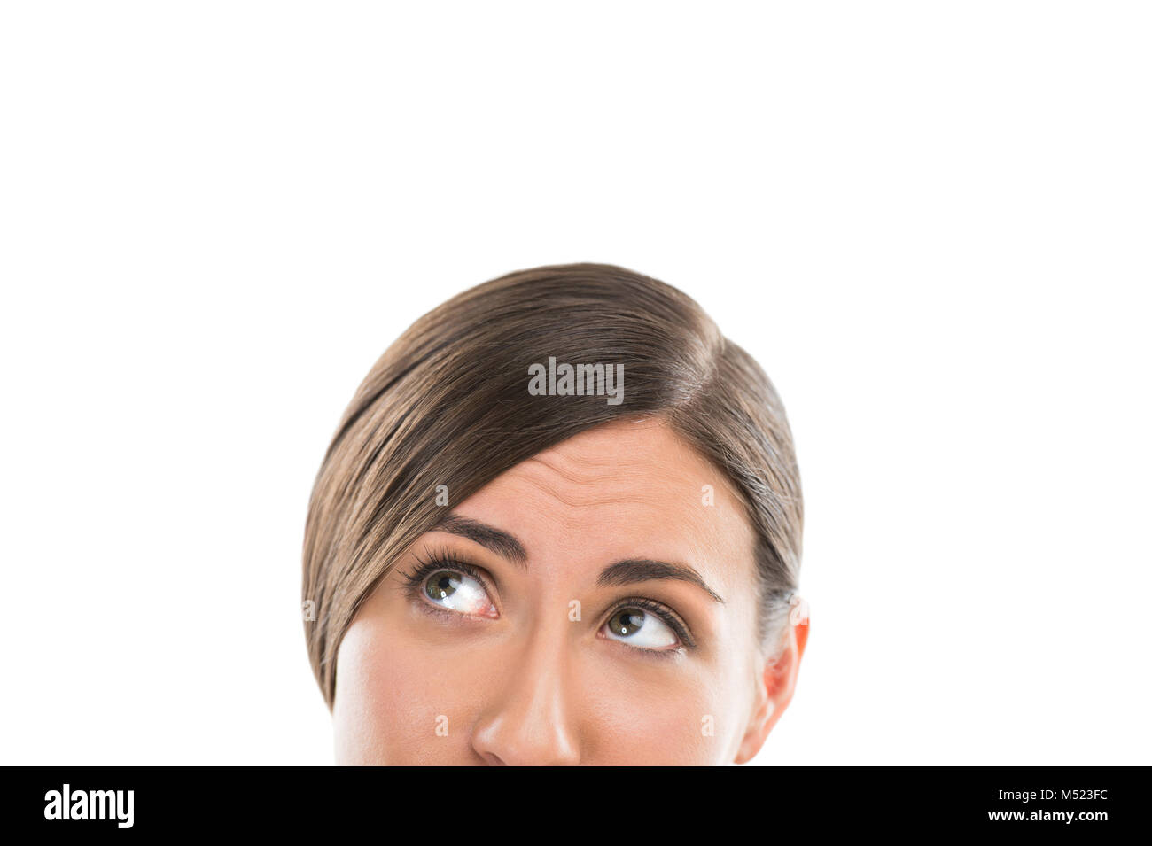 Cropped view of a beautiful young lady face over white background Stock ...