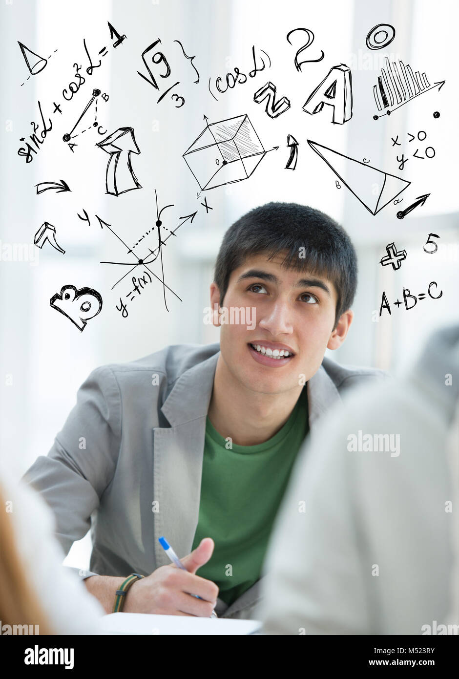 Young guy student at school with math symbols overhead. Education ...