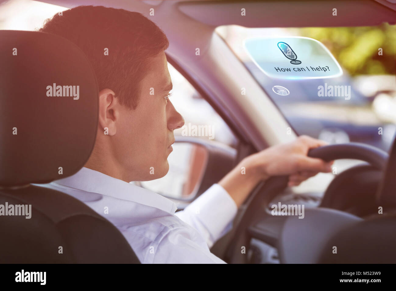 The young man behind the wheel driving car Stock Photo - Alamy