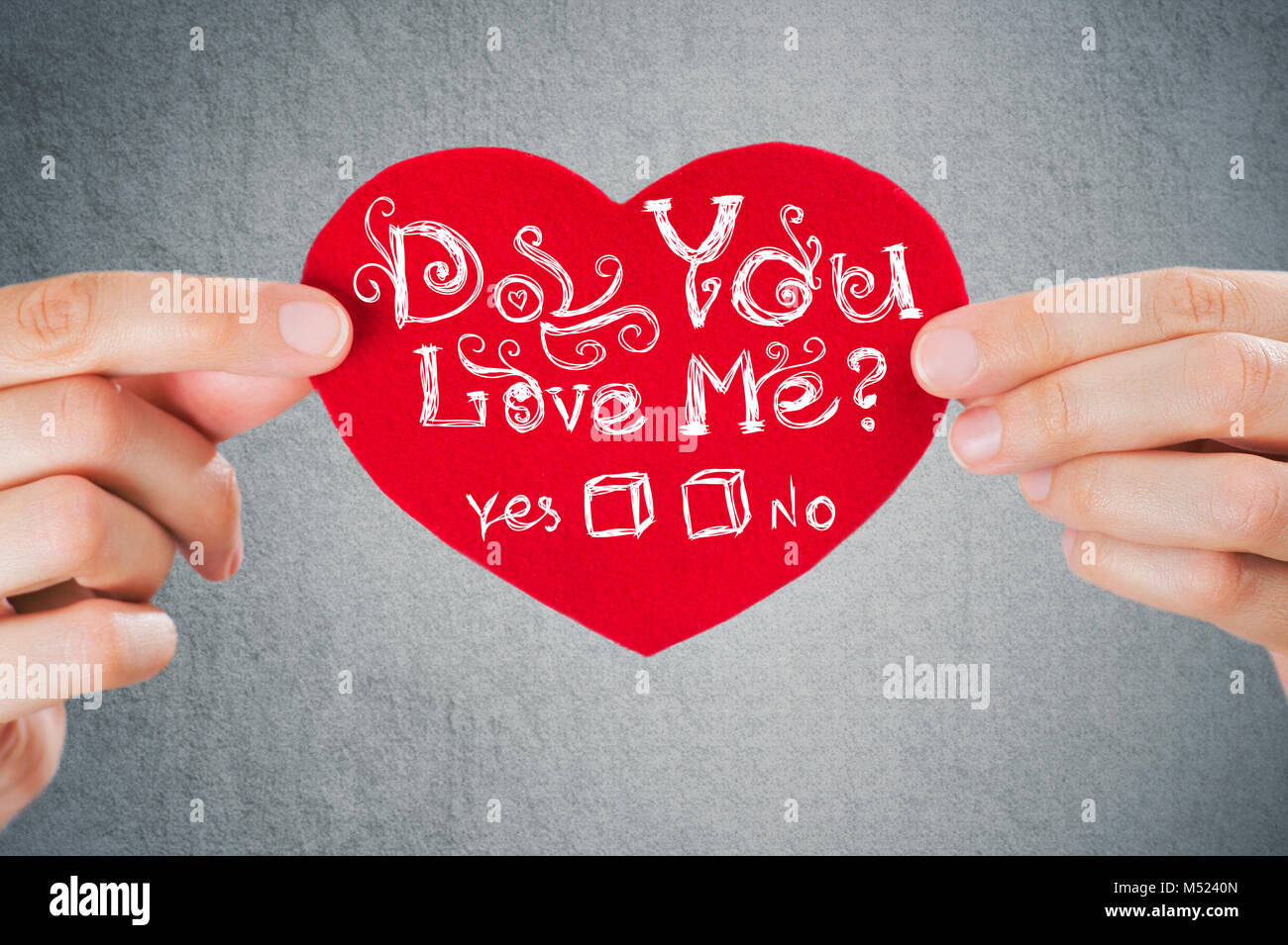 Do you love me? Valentine's day background. Closeup of female hands ...