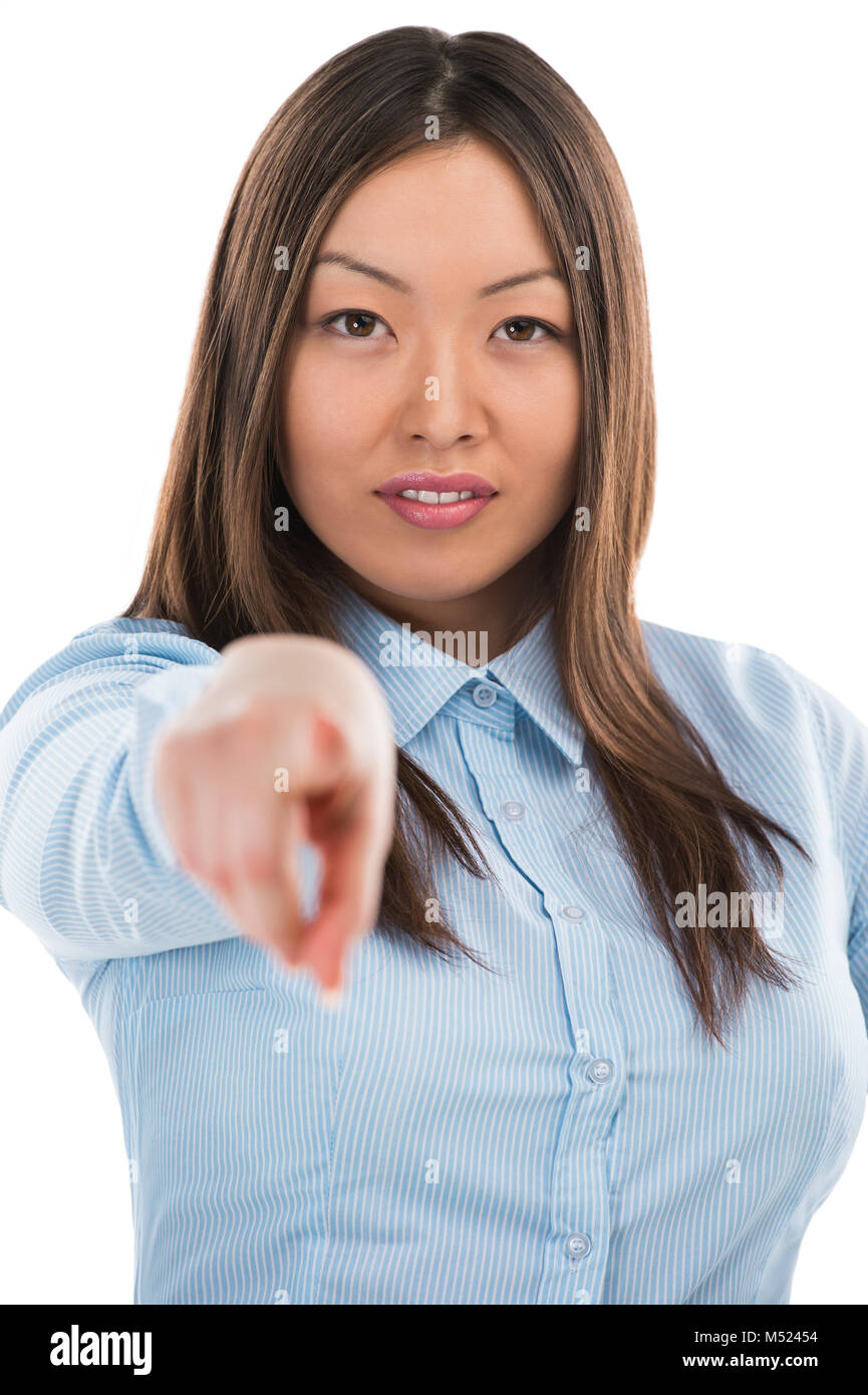 Portrait of beautiful young woman pointing at you with one hand ...