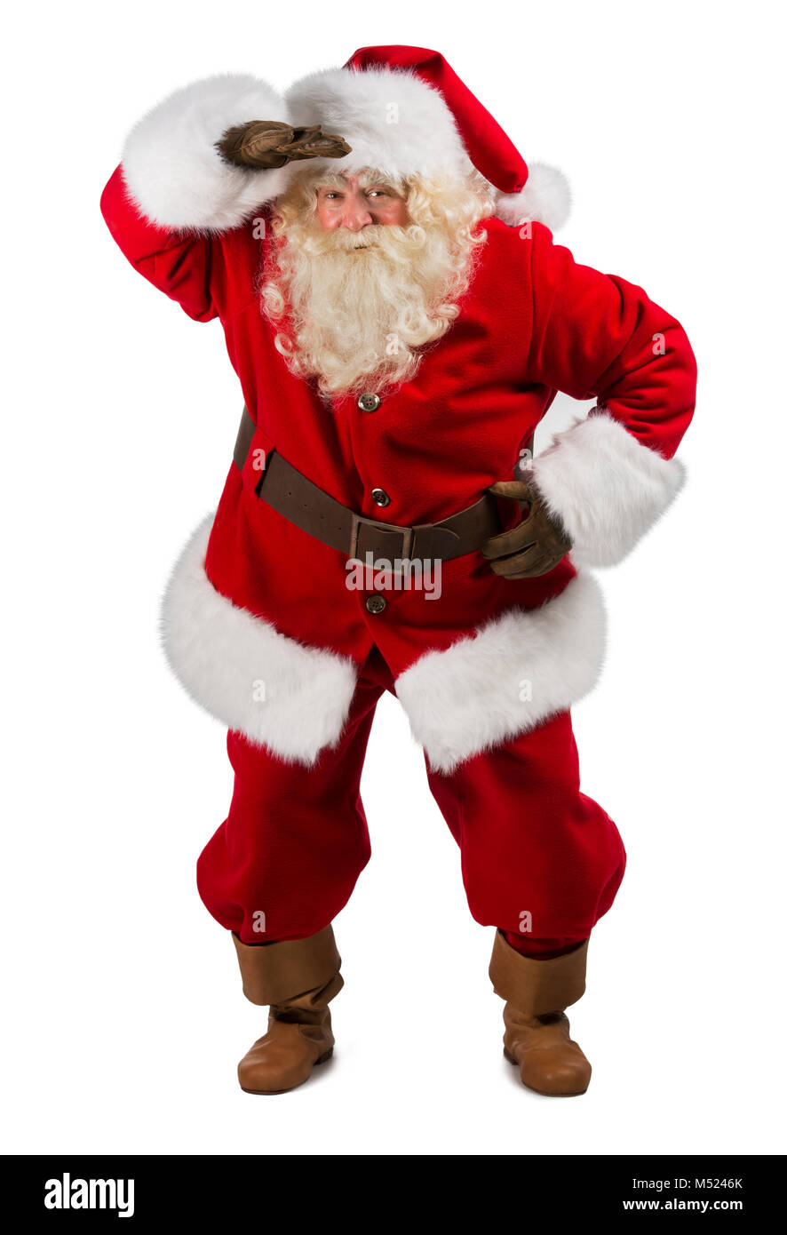 Santa Claus standing isolated on white background and peering far away ...