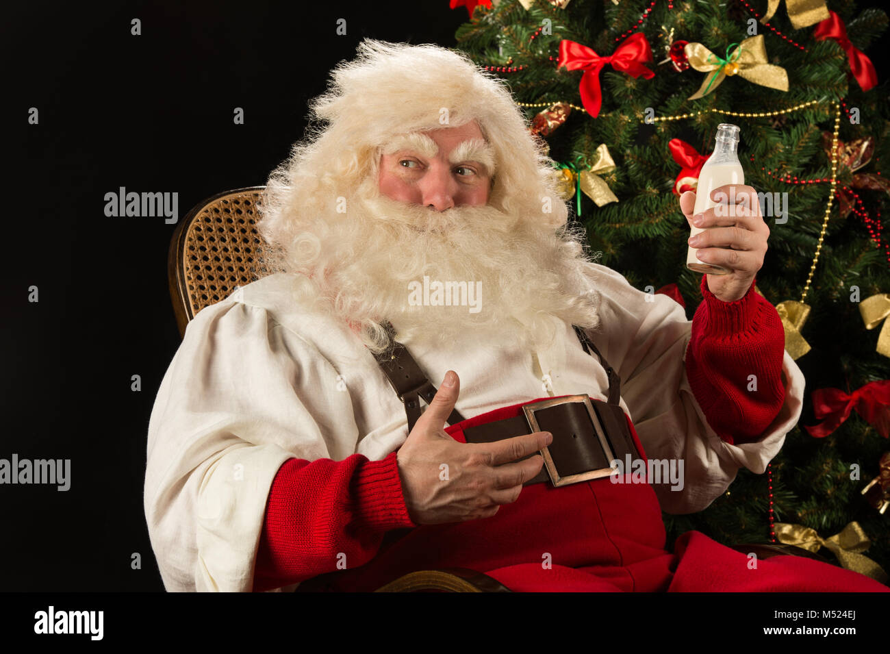 Santa claus drinking milk hi-res stock photography and images - Alamy