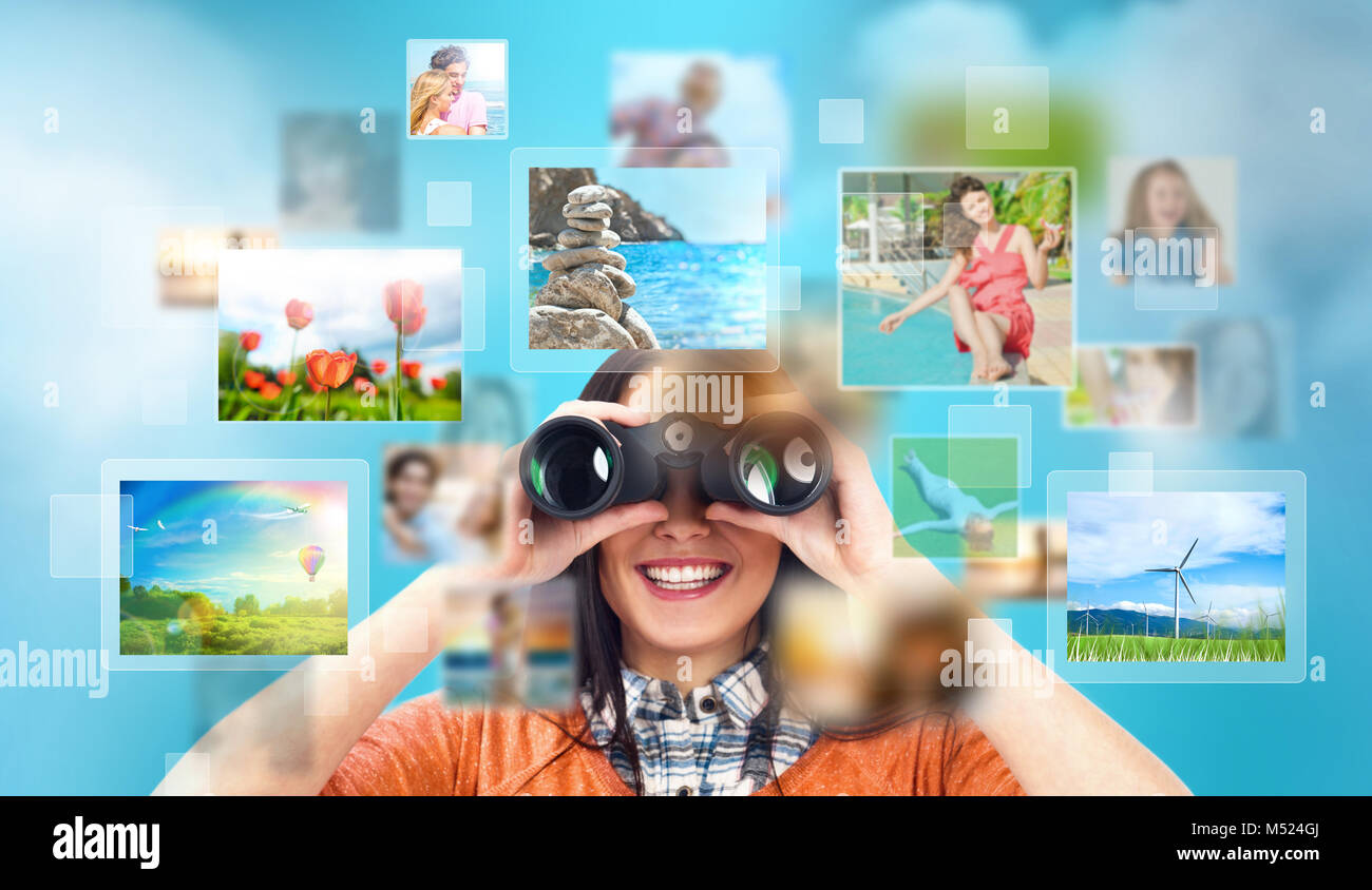 Female designer looking for stock photos online Stock Photo - Alamy