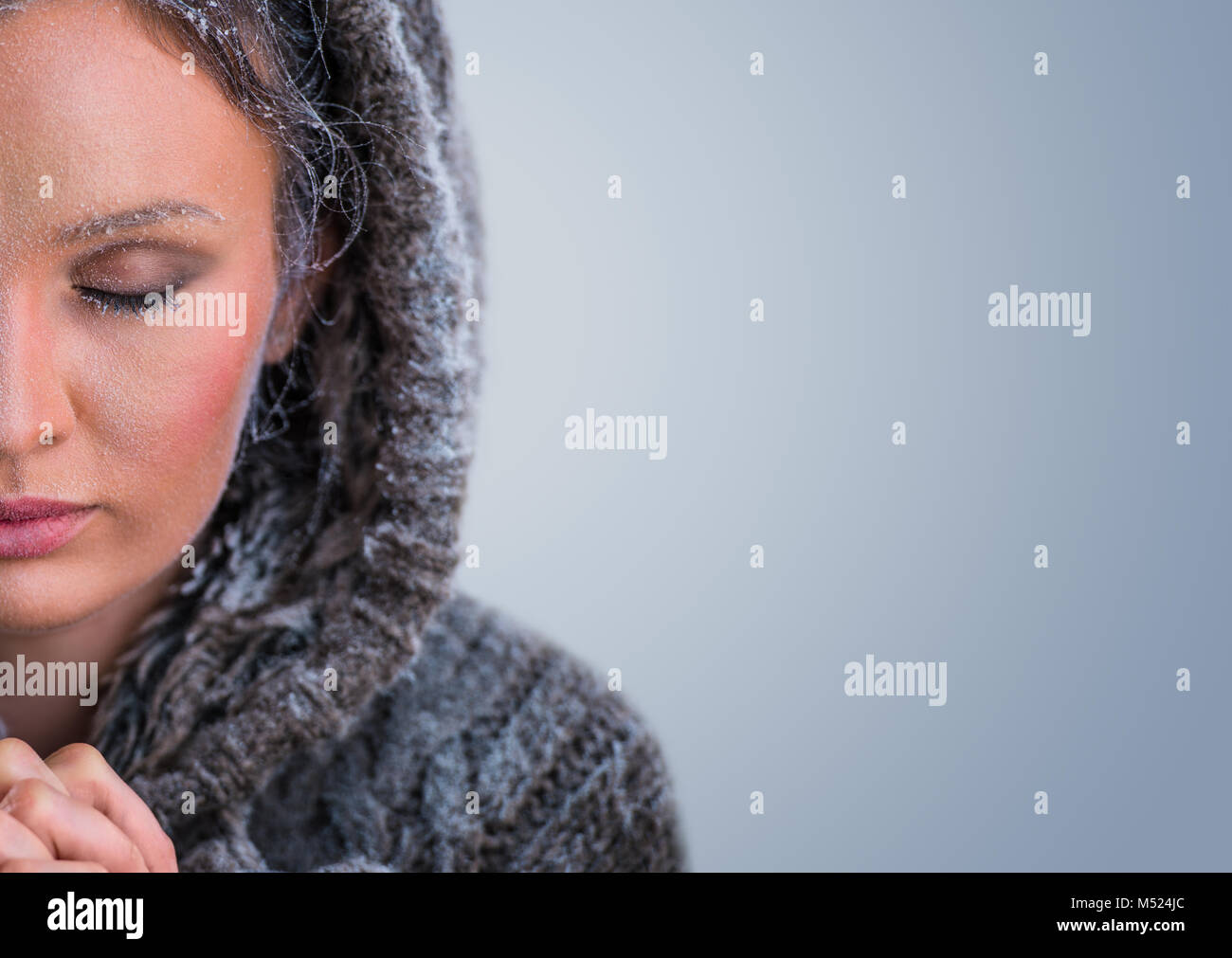 Beautiful Winter Woman with frost makeup on blue background Stock Photo ...