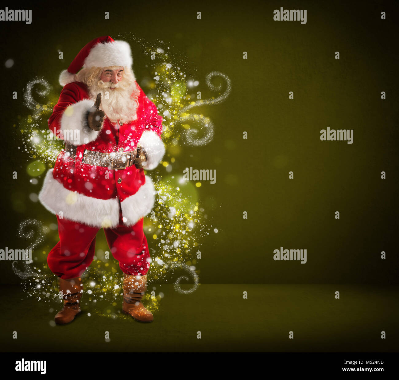 Santa Claus making magic. Collage. Full length portrait Stock Photo - Alamy