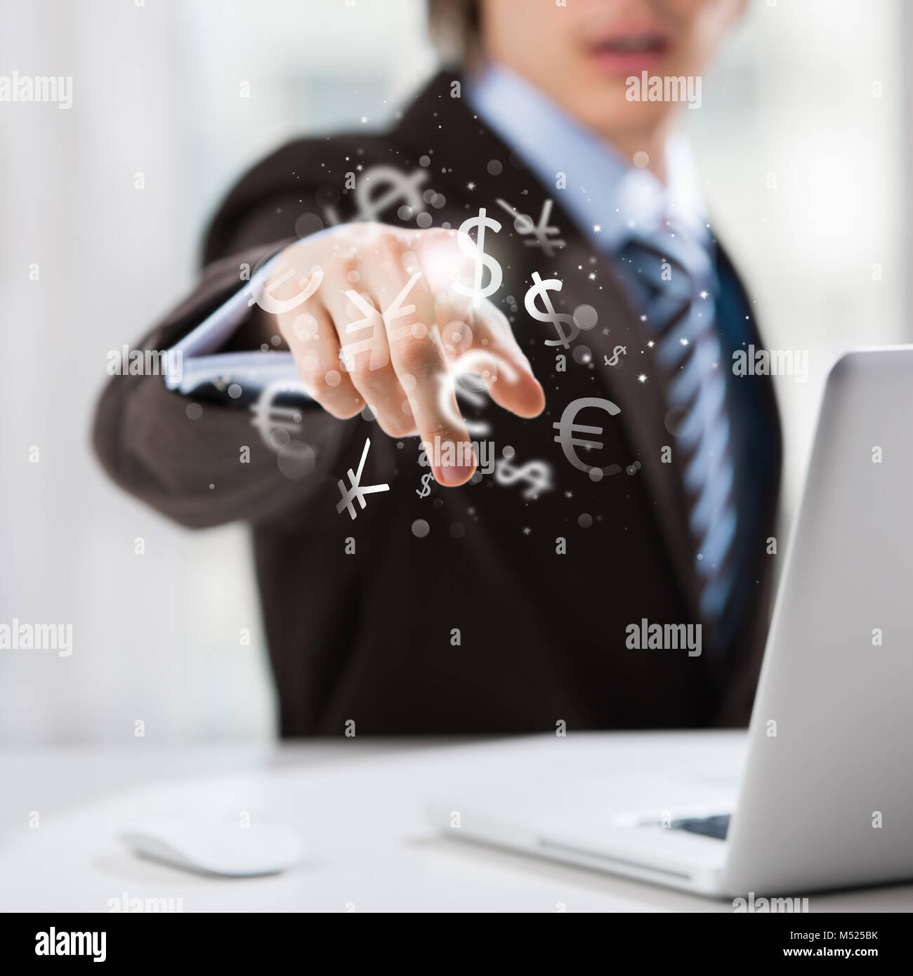 Investment concept. Handsome business man with currency symbols Stock ...