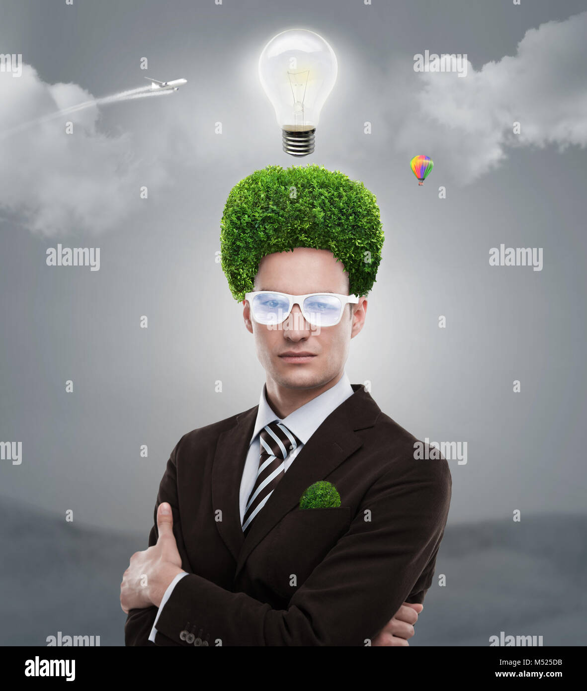 Man with greenery on his head. Loving nature and taking care of ecology ...