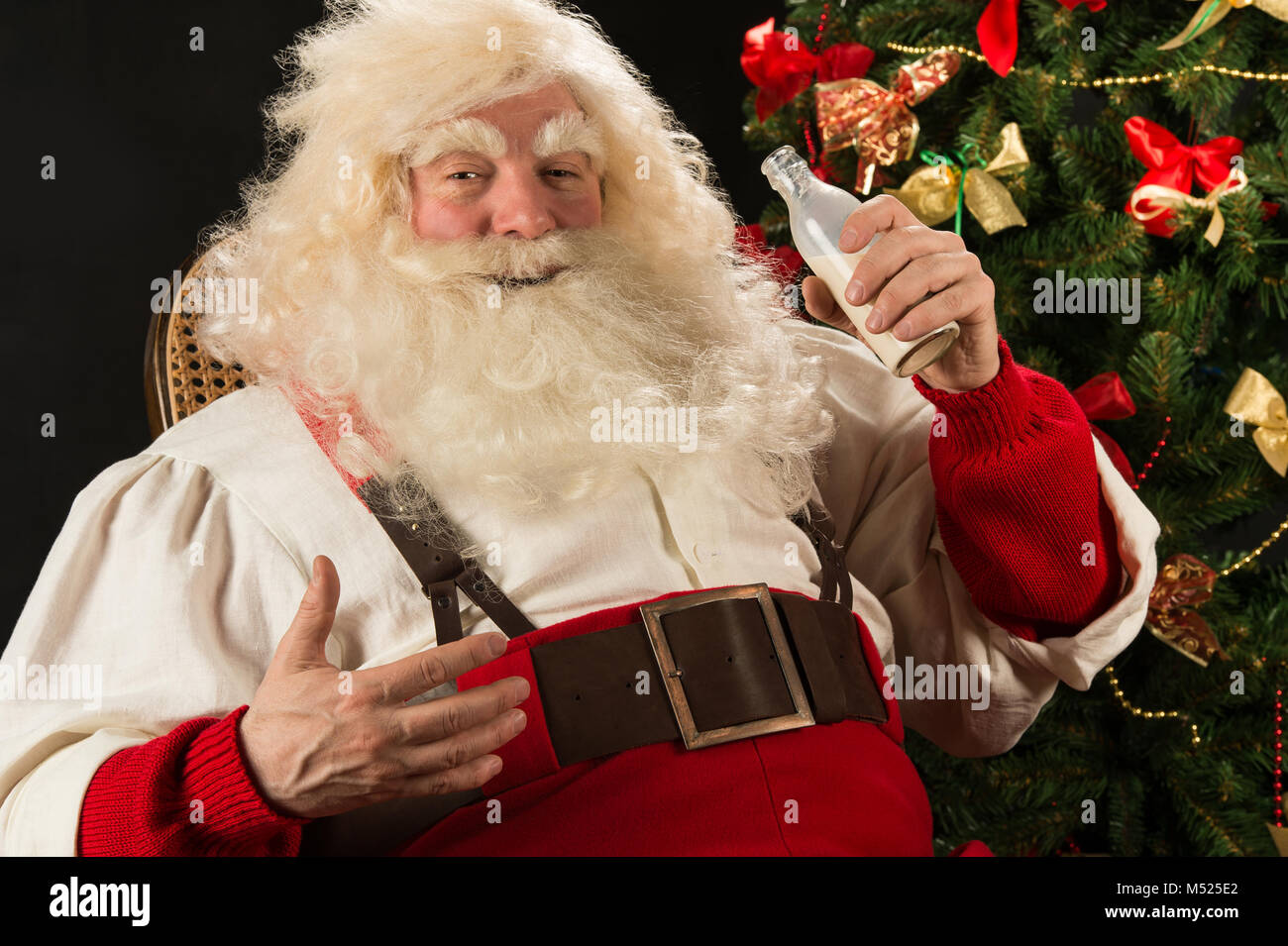 Santa claus drinking milk hi-res stock photography and images - Alamy