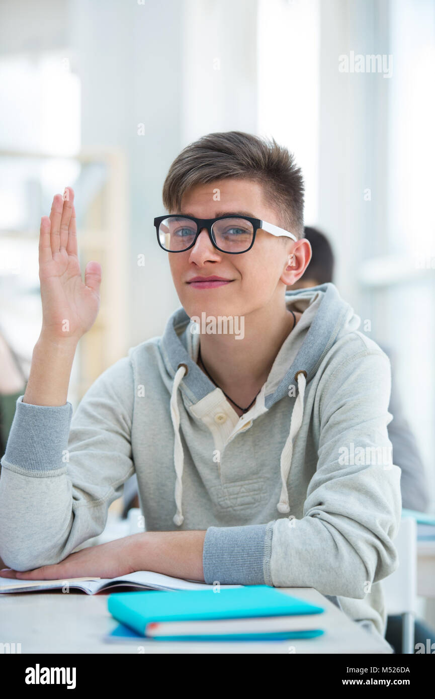 High School students. Student raising his hand in university Stock ...