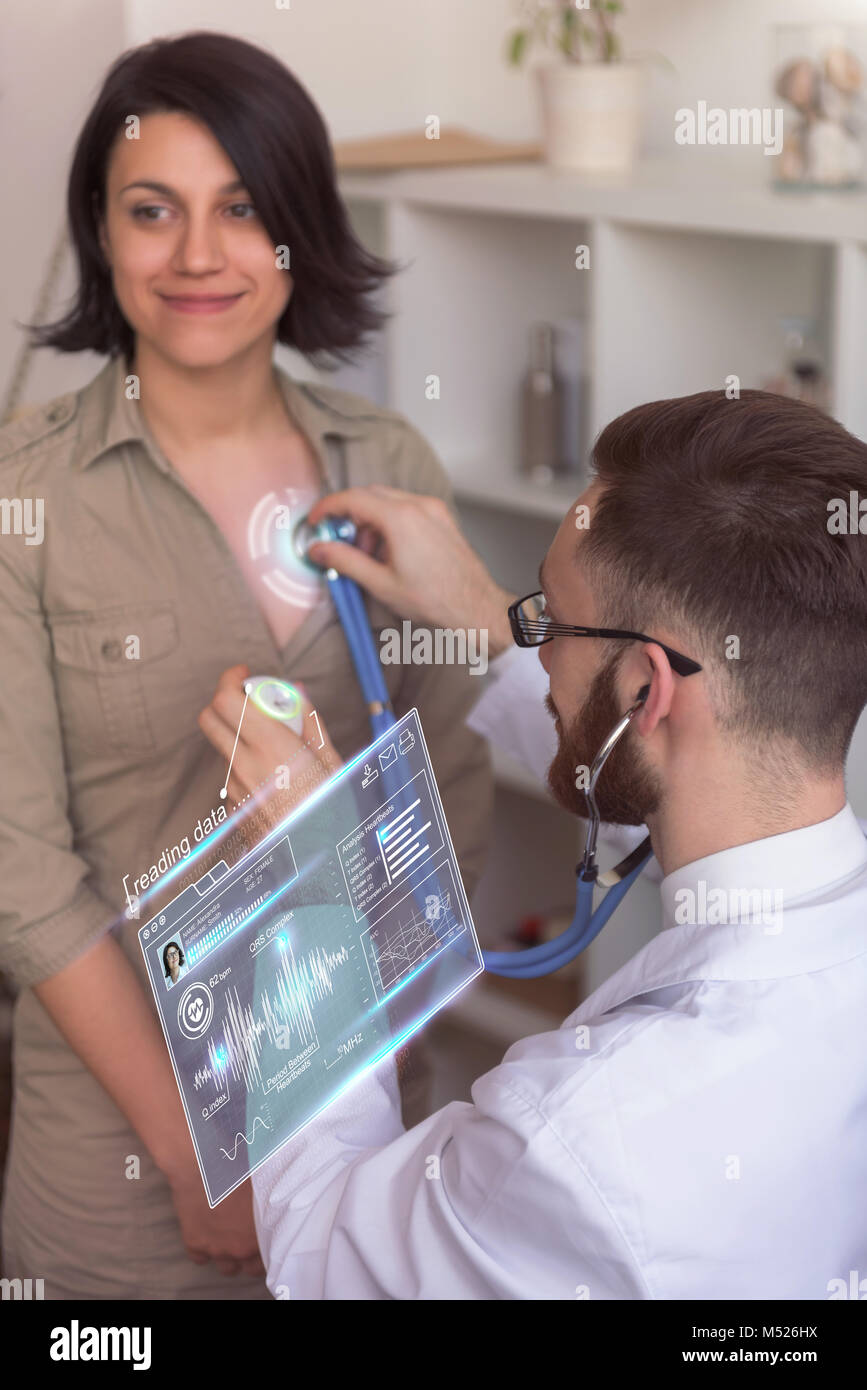 At doctor office. Doctor listening patient breathing Stock Photo - Alamy