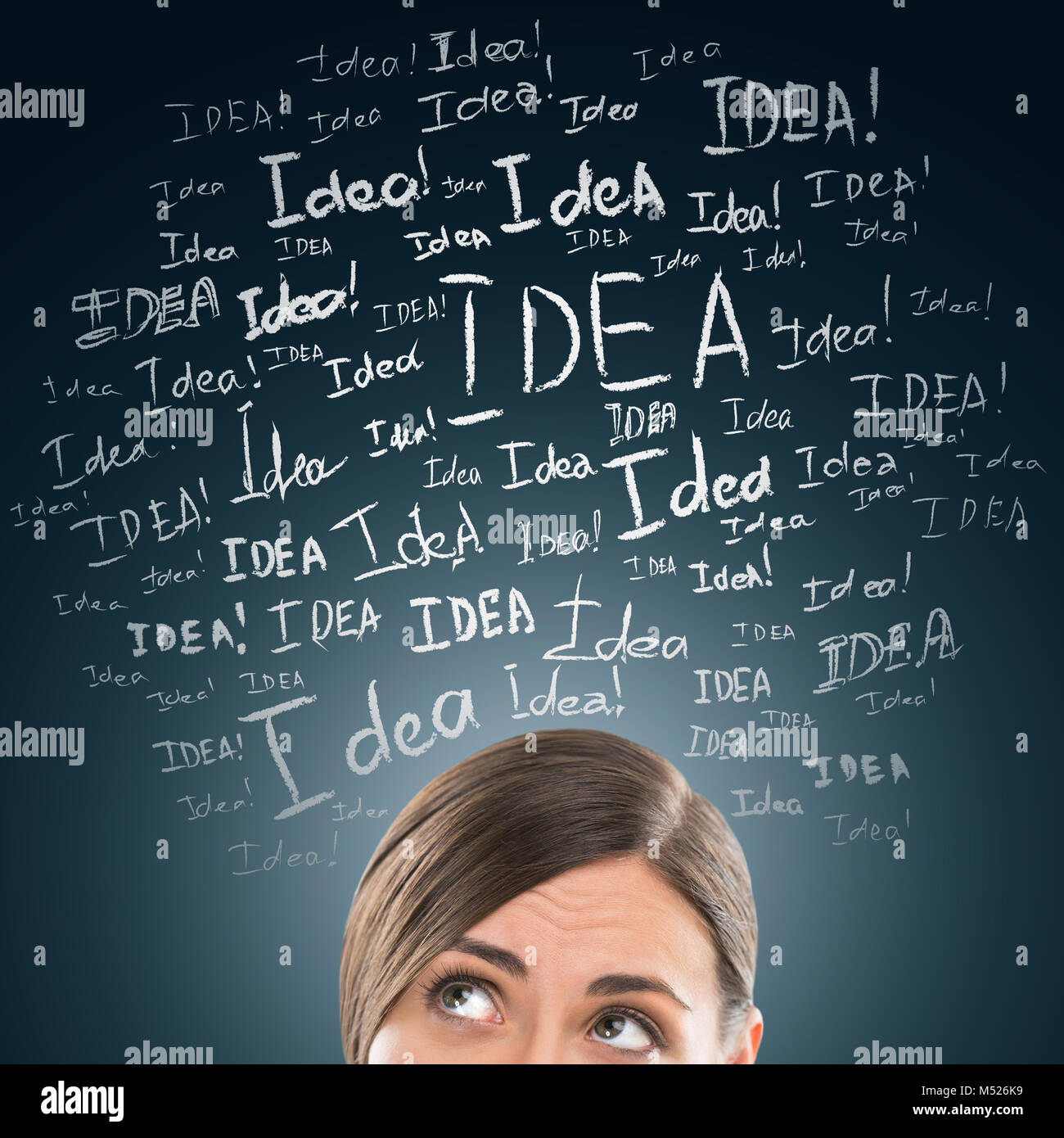 Idea concept. Young business woman with idea signs in front Stock Photo ...