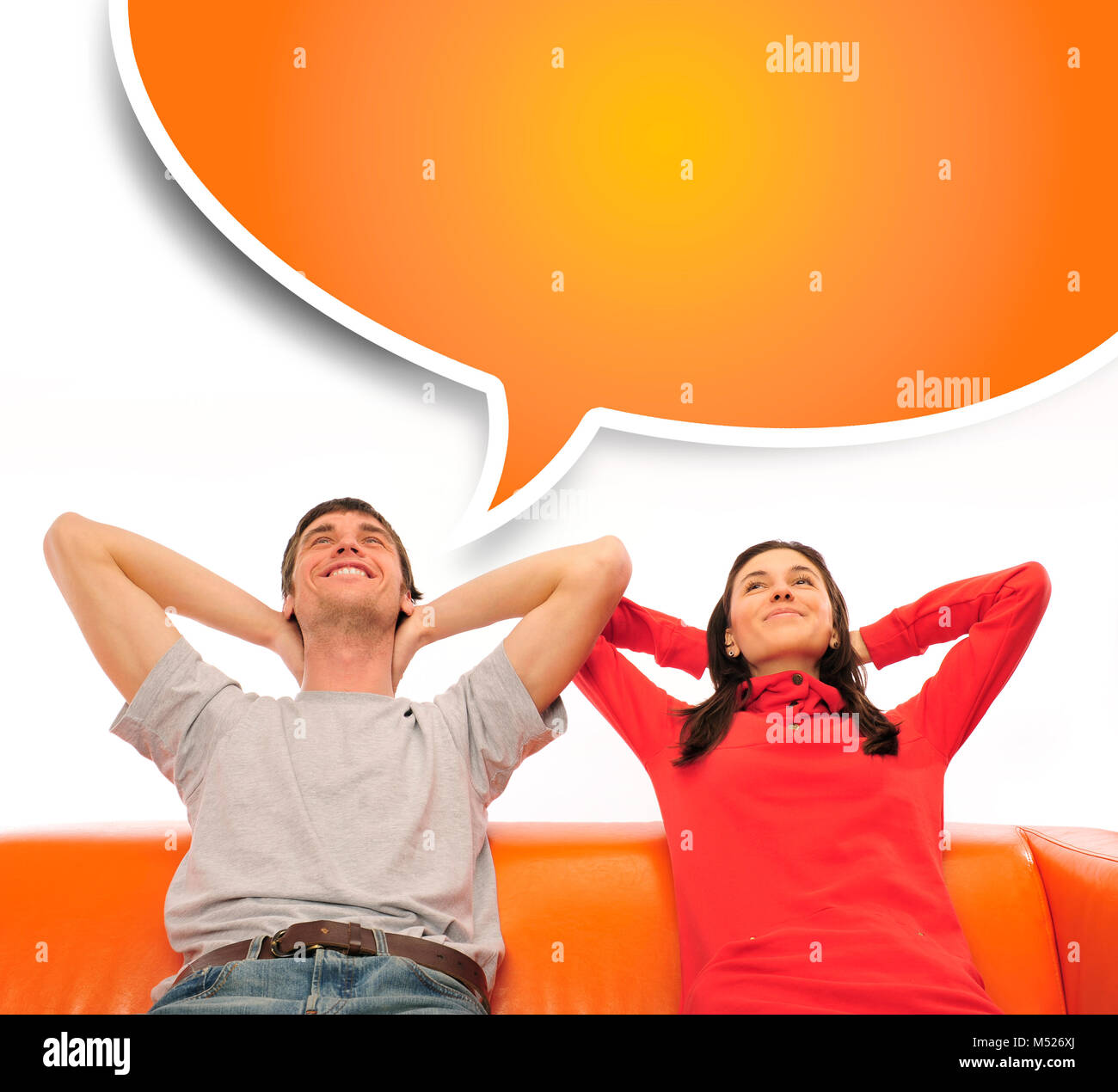 Young couple thinking on the sofa Stock Photo - Alamy