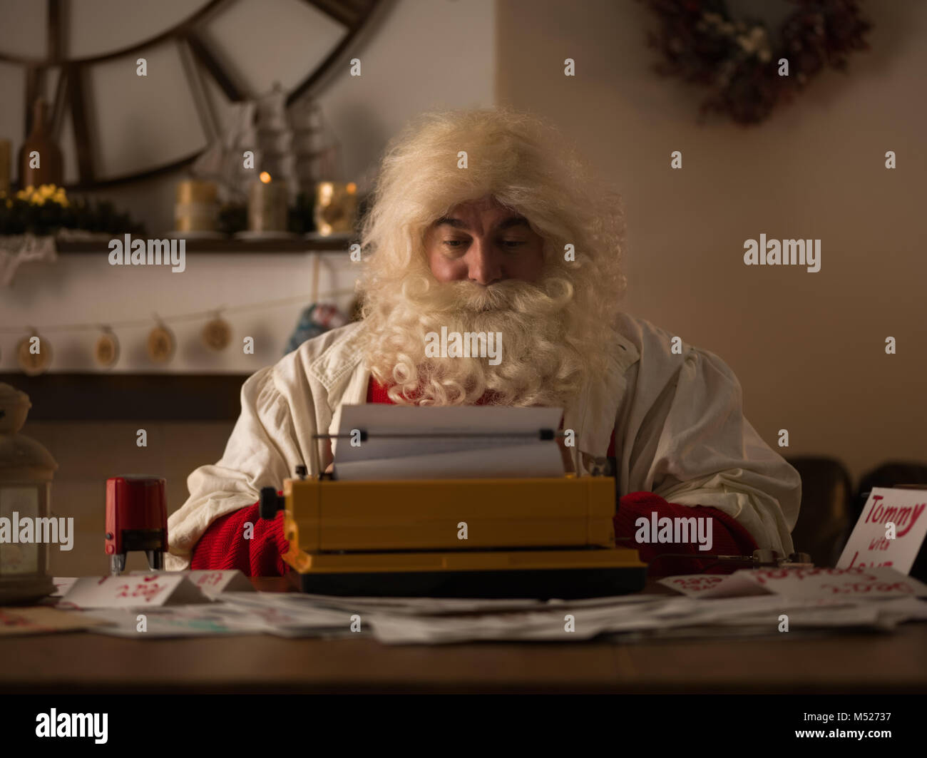 Santa Claus Working at Home. Reading and Writing letters for Children ...