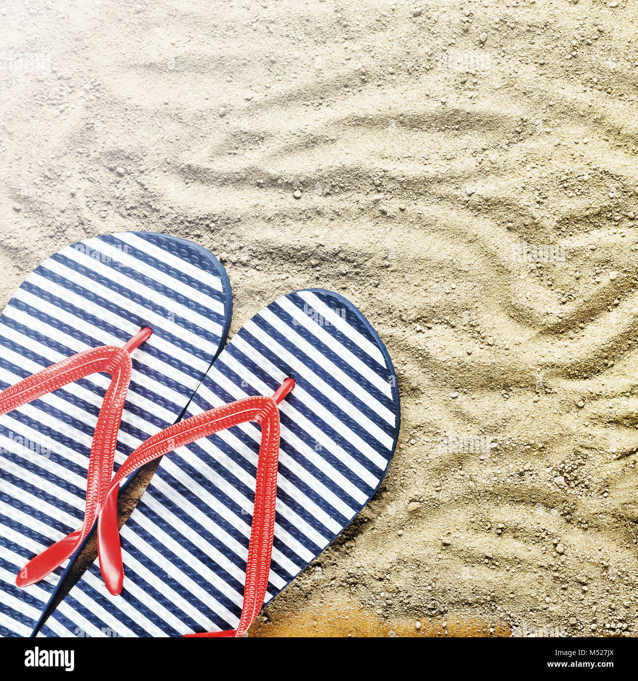 Beach background. Beach slippers and sunglasses Stock Photo - Alamy
