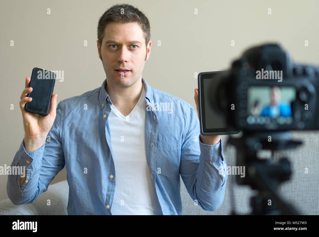 Man filming video with mobile phone hi-res stock photography and images ...