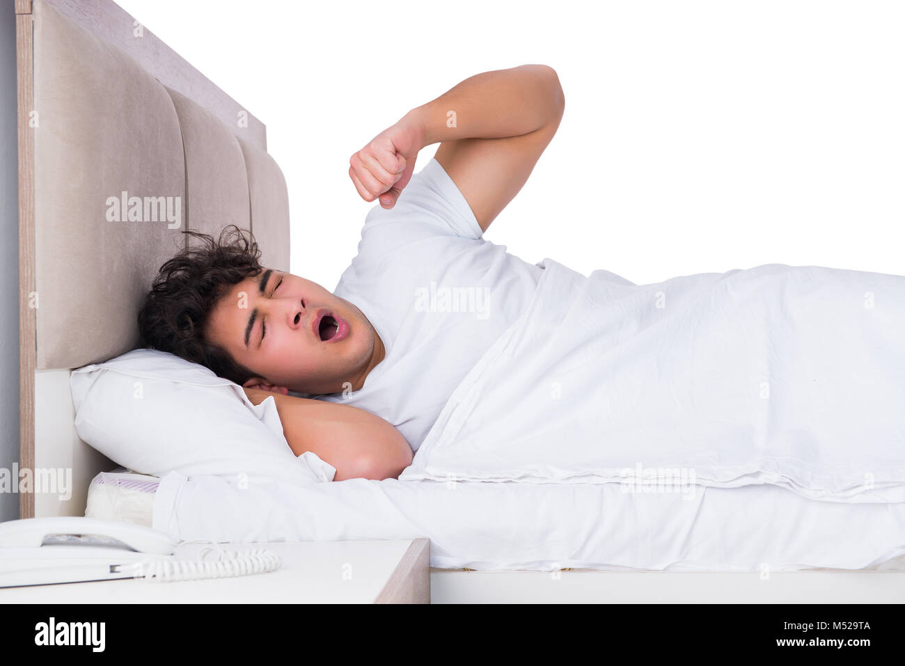 Man in bed suffering from insomnia Stock Photo - Alamy