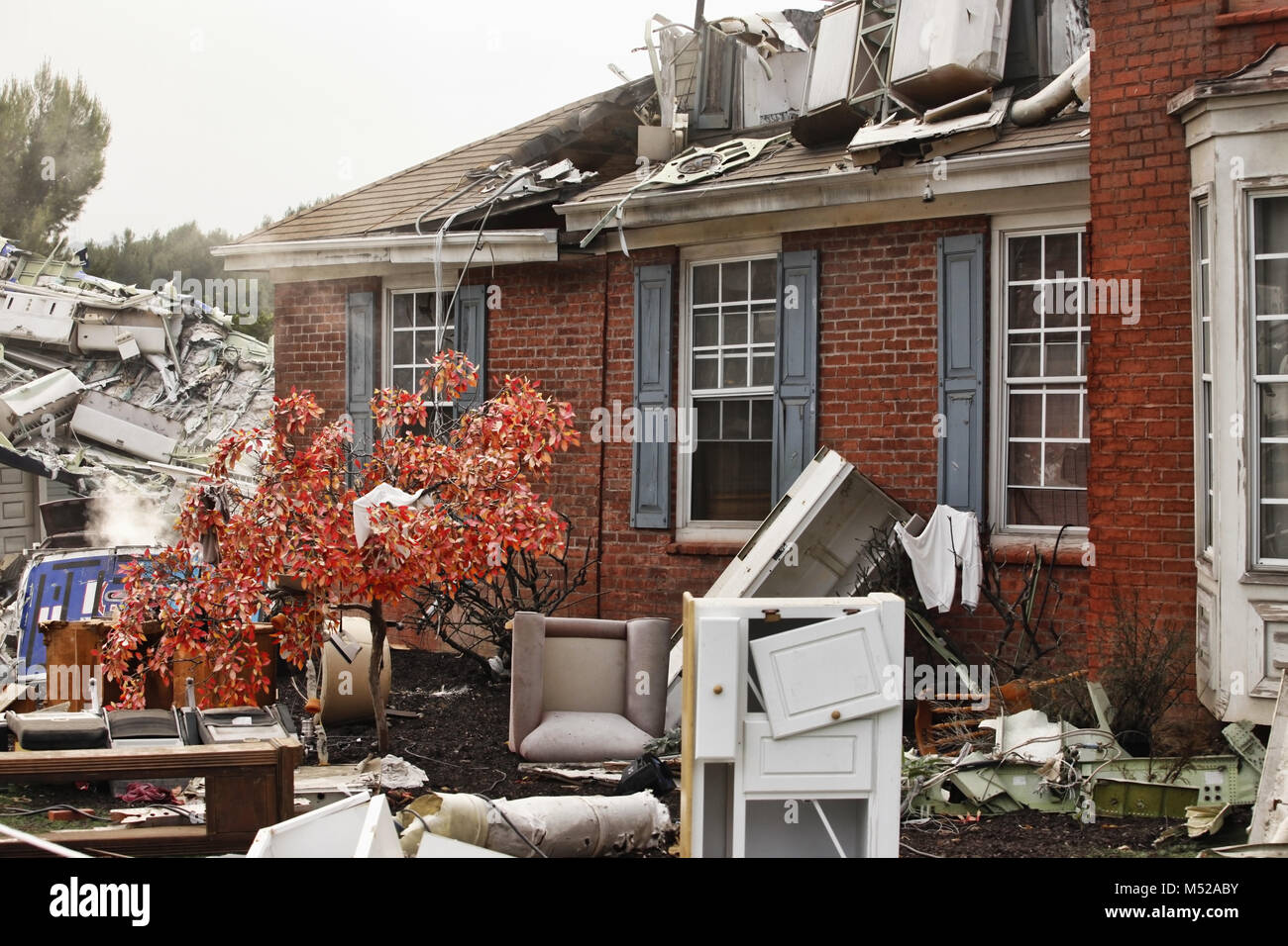 House damaged by disaster Stock Photo - Alamy