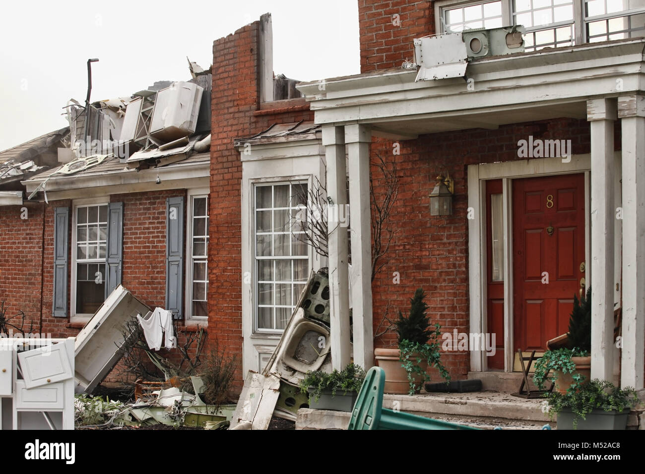 House damaged by disaster Stock Photo - Alamy
