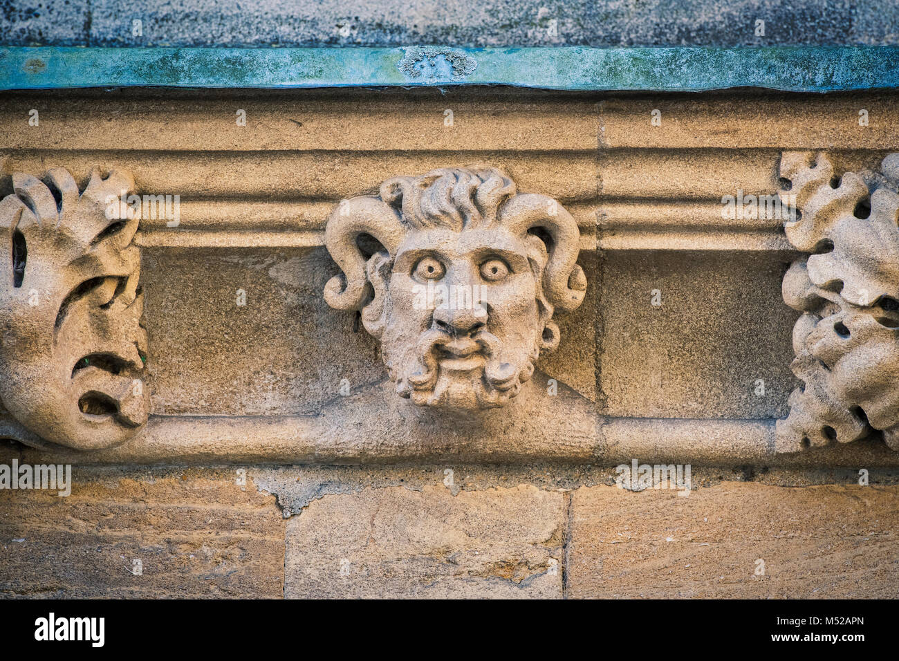 Carved stone face on wall hi-res stock photography and images - Alamy