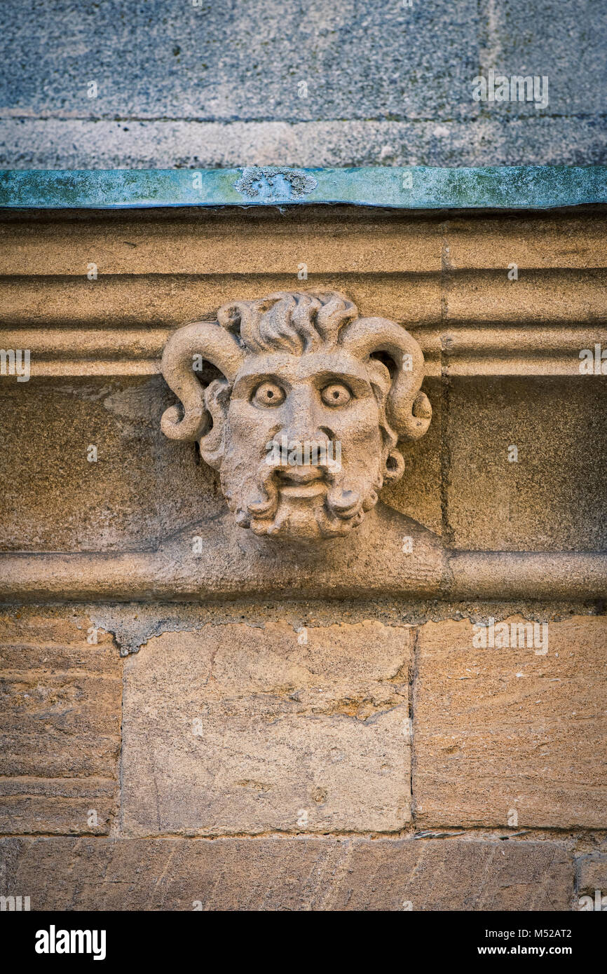 Carved stone horned gargoyle / grotesque on Merton college. Oxford ...