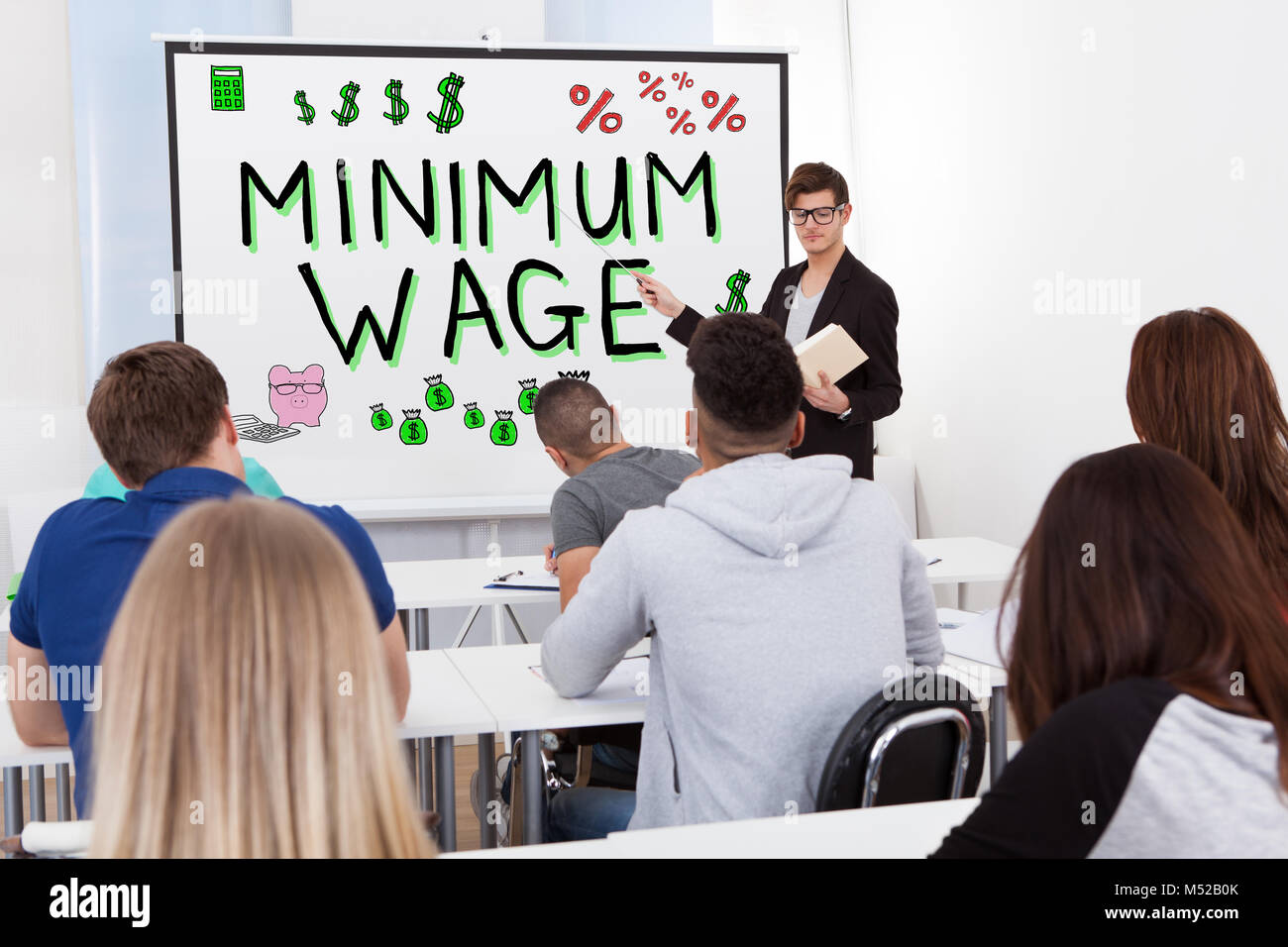 Teacher Giving Minimum Wage Lecture To Students Stock Photo - Alamy