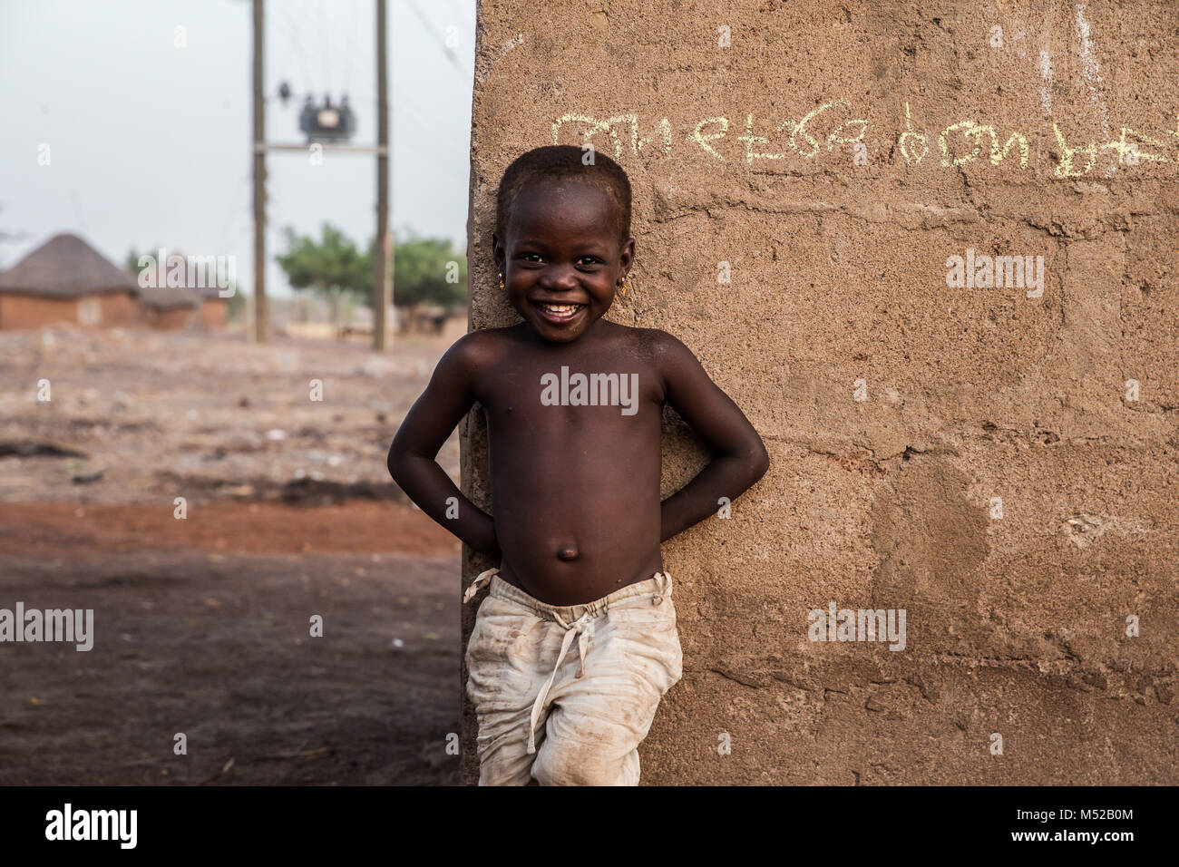 A young Ghanaian boy seen posing for a photo in the remote village of ...