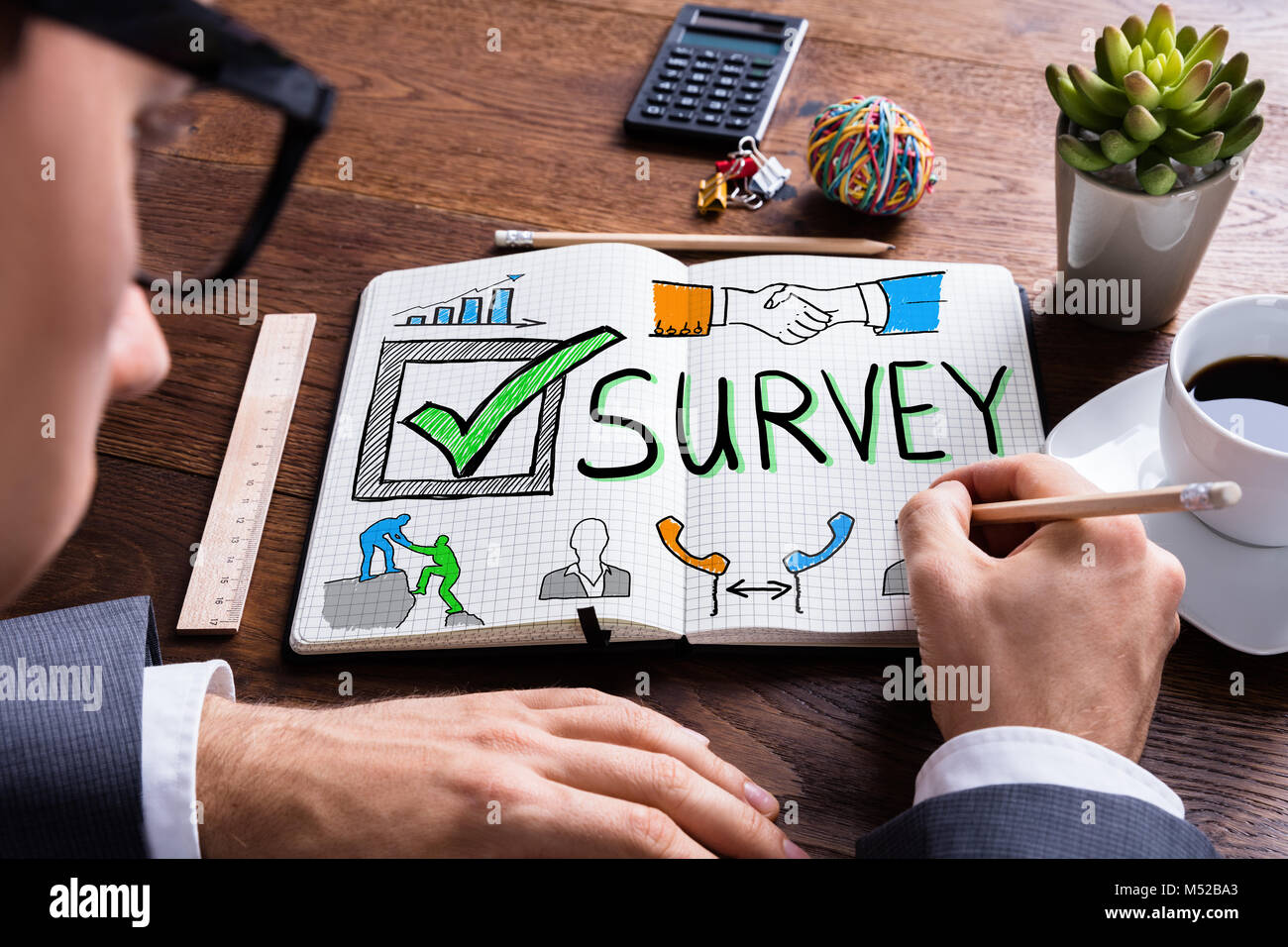 Man Drawing Customer Satisfaction Survey Concept In Notepad Stock Photo ...