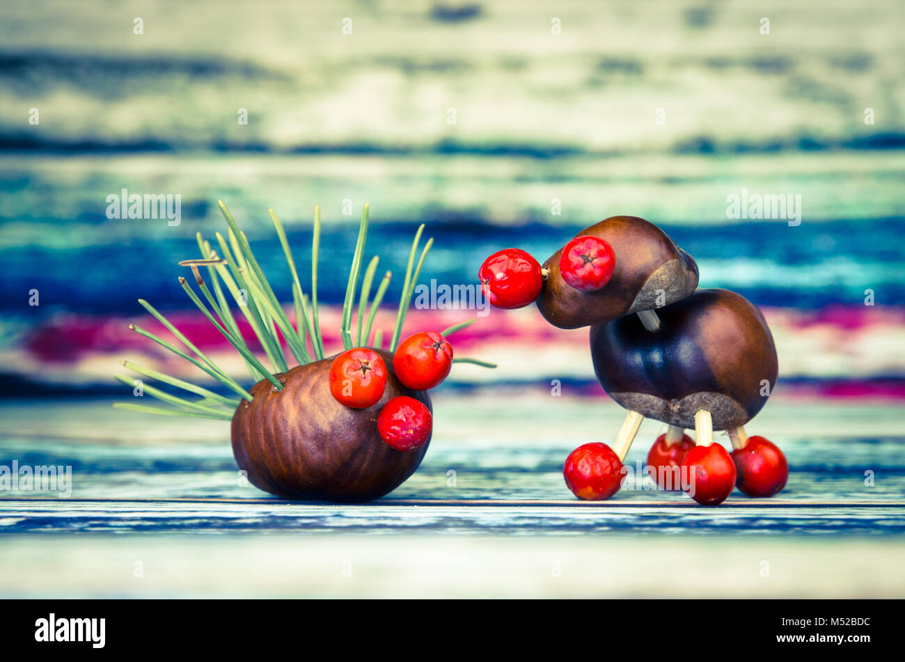 fantasy autumn figures made from chestnuts Stock Photo - Alamy