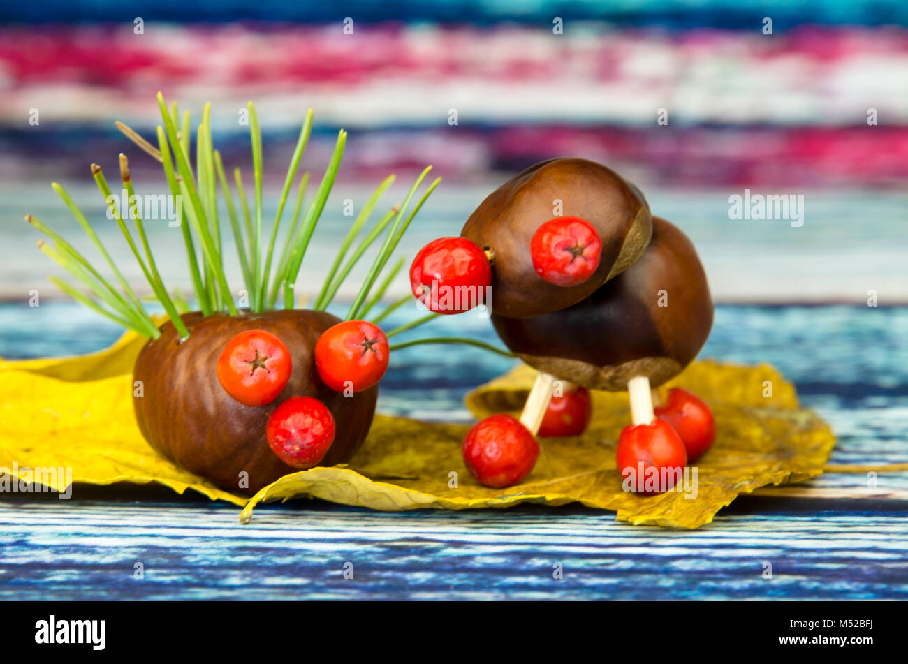 lovely fantasy autumn figures made from chestnut Stock Photo - Alamy