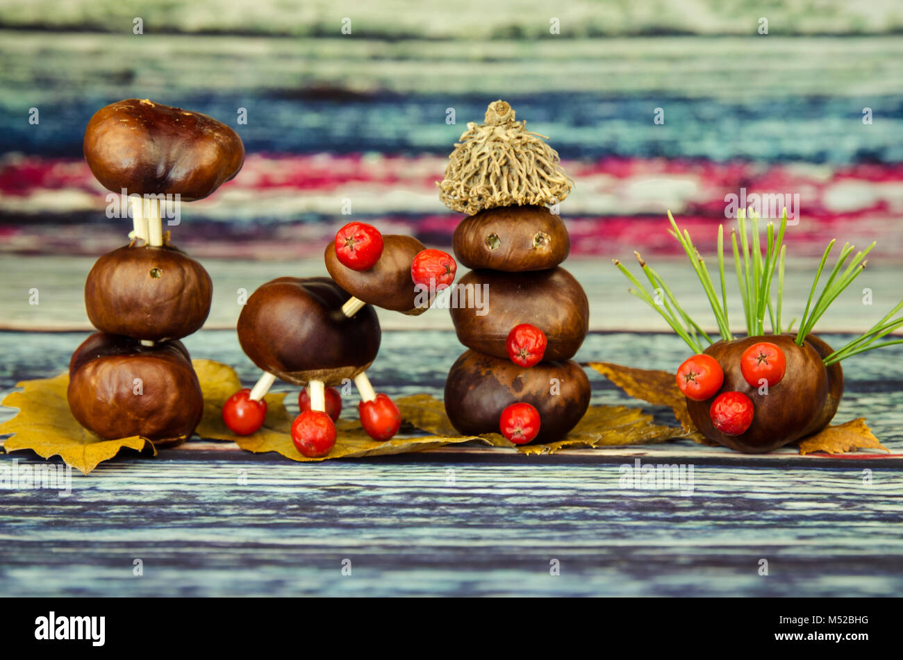 lovely autumn figures made from chestnuts Stock Photo - Alamy