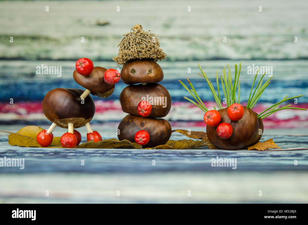 fantasy autumn figures made from chestnuts Stock Photo - Alamy