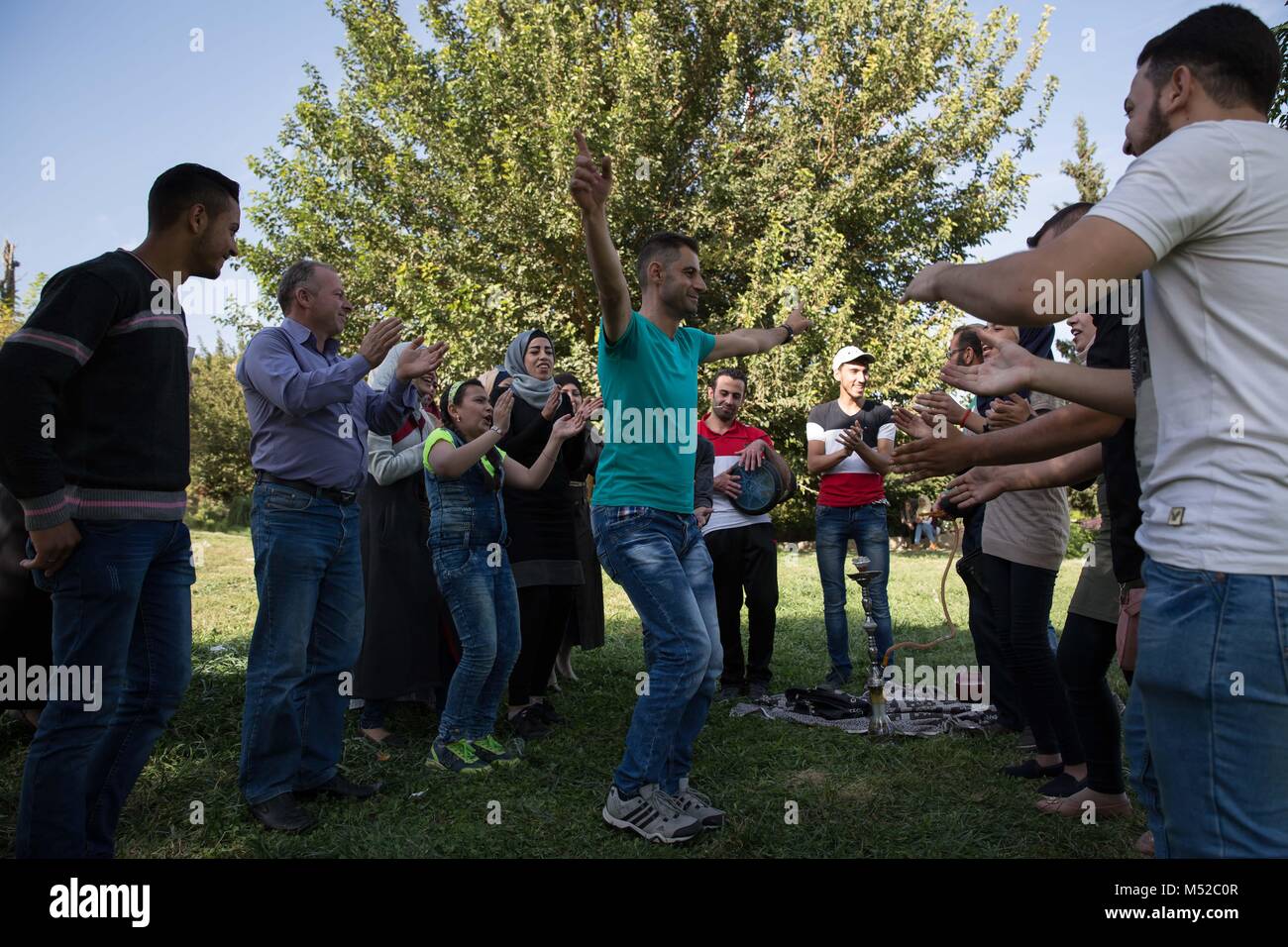 Young men on leave from military service gather in Damascus' Tishreen ...
