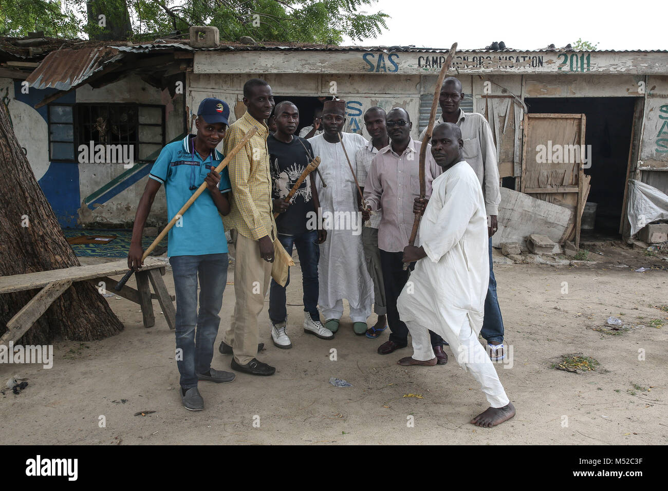Sector 10 of the CJTF vigilante group pose for a photo. The vigilantes ...