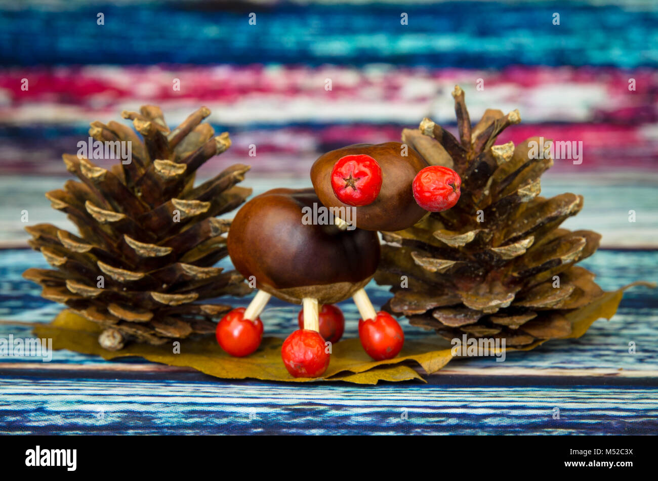 lovely fantasy autumn figures made from chestnut Stock Photo - Alamy