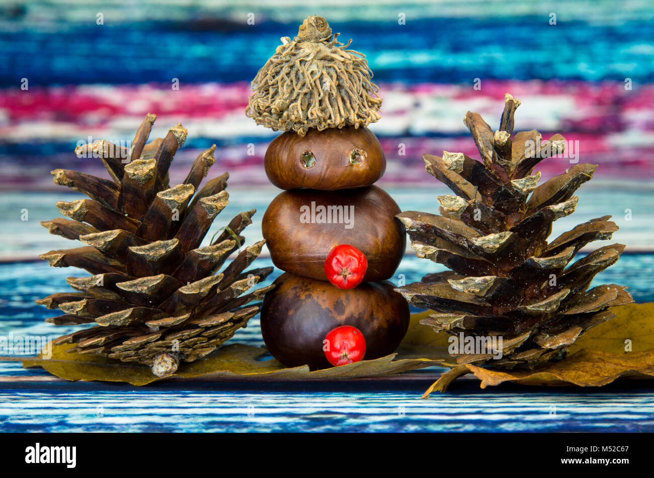 lovely fantasy autumn figures made from chestnut Stock Photo - Alamy