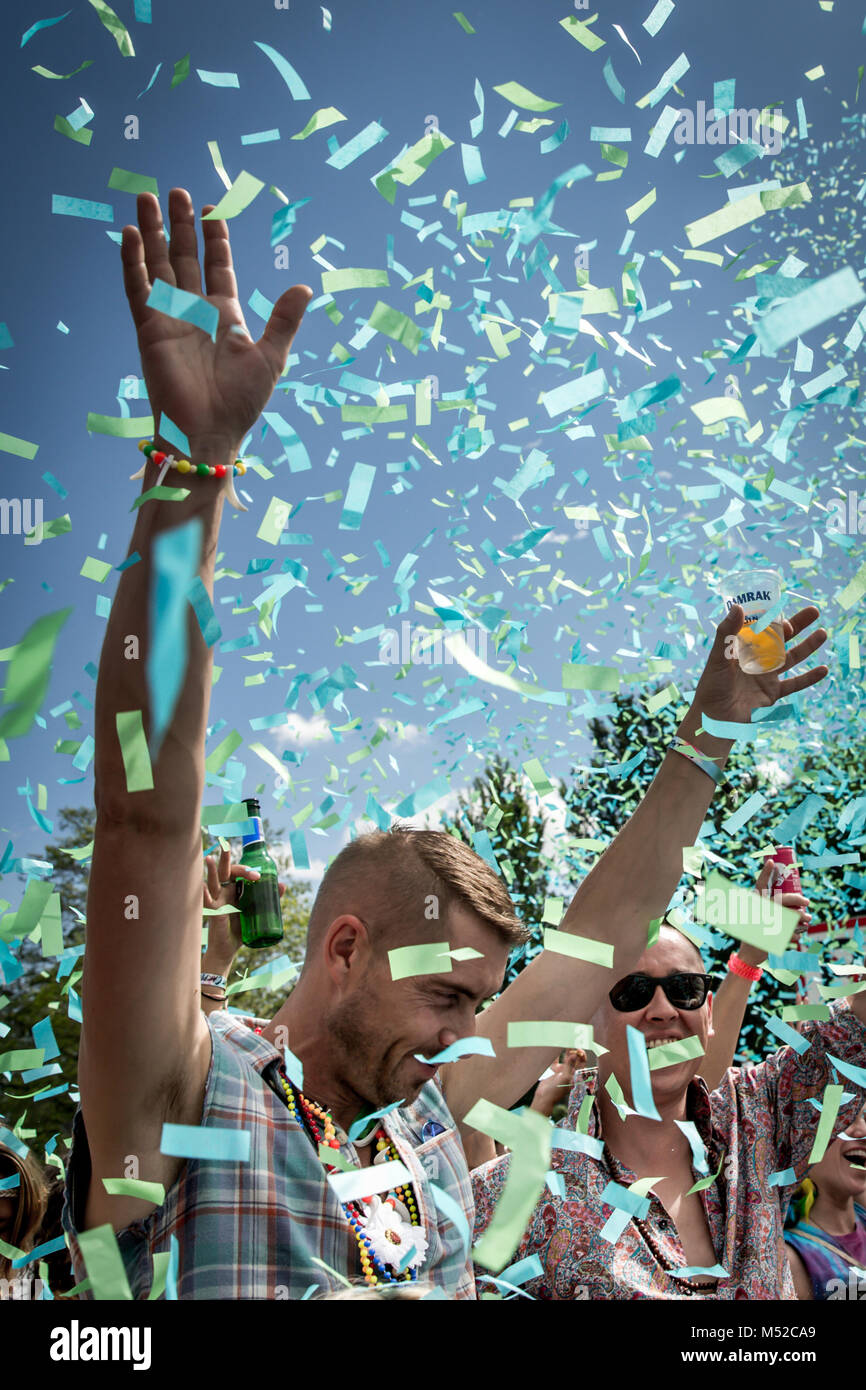 A male participant seen dancing with the confetti being spreaded during ...