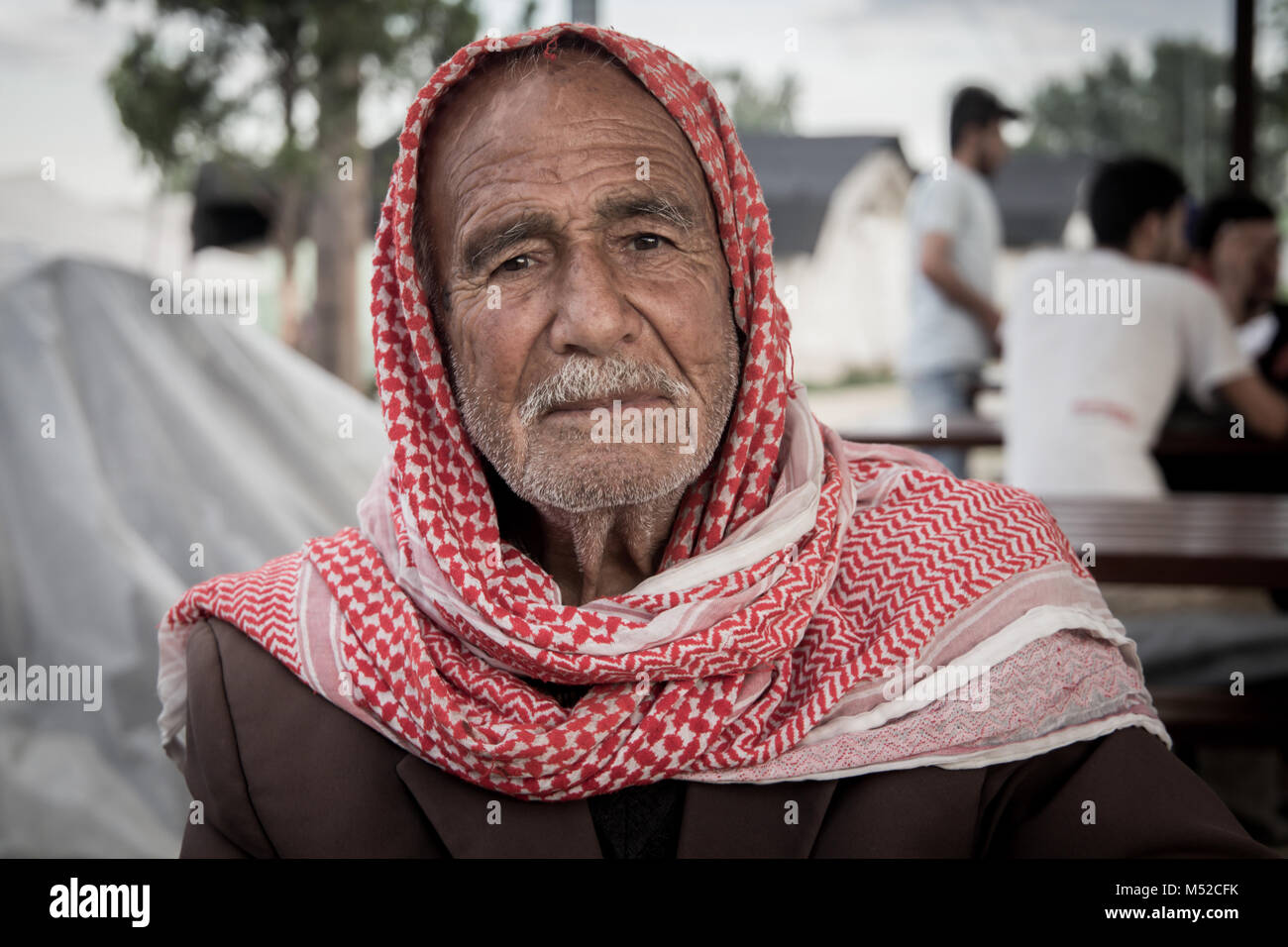 Old man at EKO refugee Camp, Greece Stock Photo - Alamy
