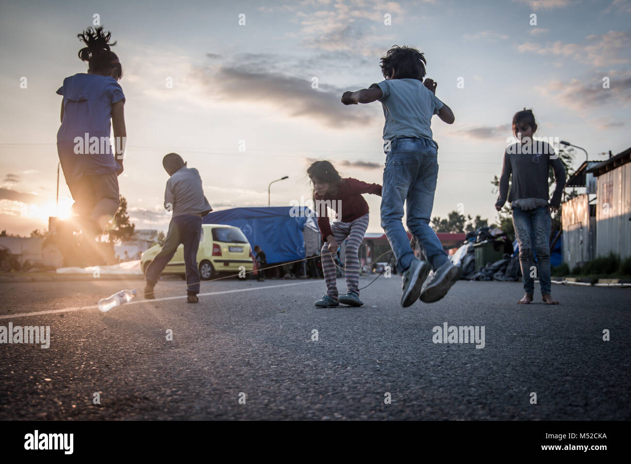 Refugee children playing europe hi-res stock photography and images - Alamy