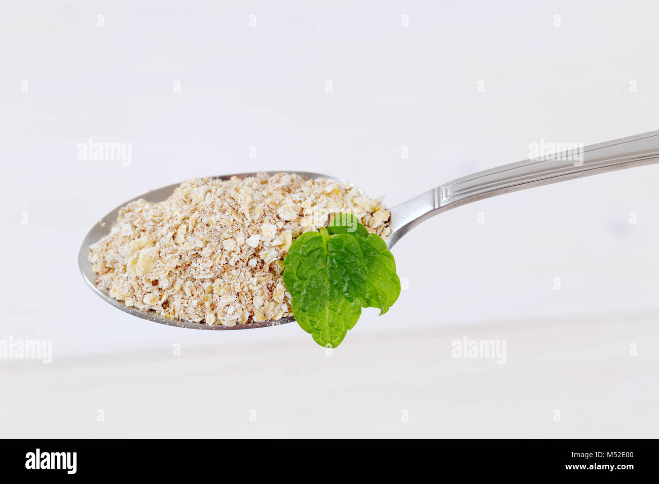 Oatmeal and spoon hi-res stock photography and images - Alamy