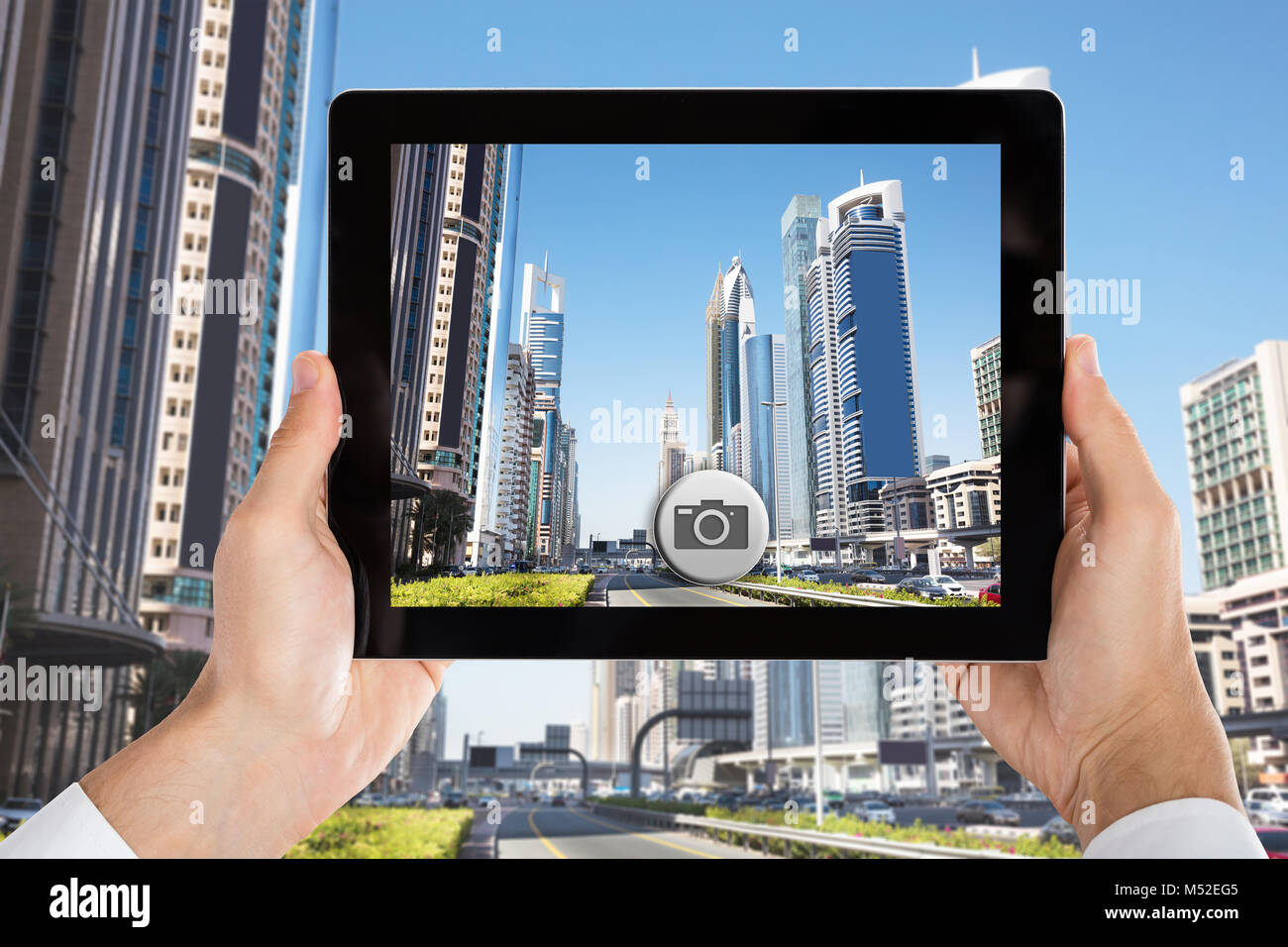 Tablet device taking picture hi-res stock photography and images - Alamy