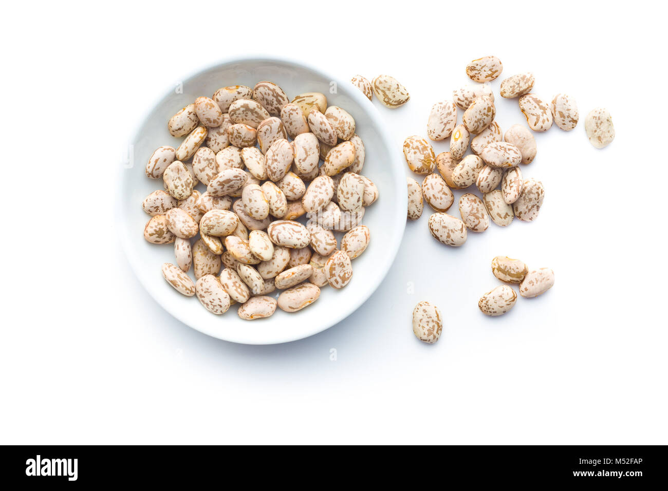 Dried borlotti beans in bowl isolated on white background. Top view ...
