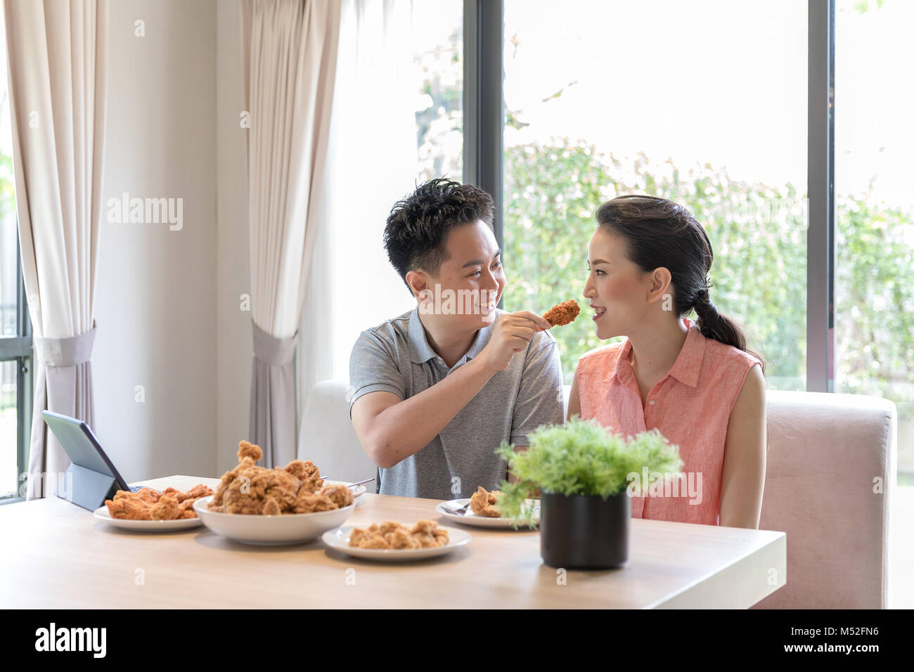 Black family eating fried chicken hi-res stock photography and images ...