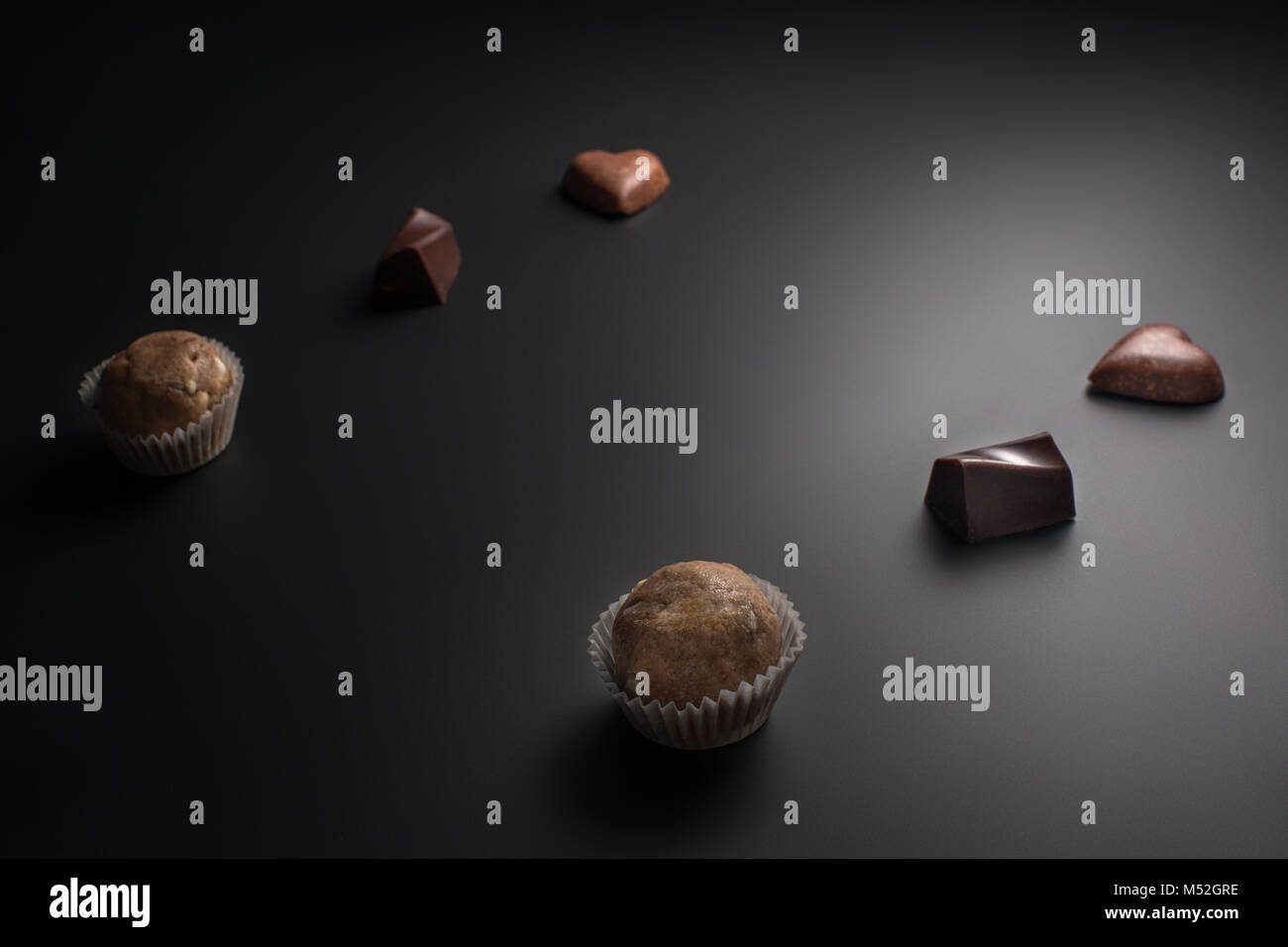Handmade bio candy isolated on a black background Stock Photo - Alamy